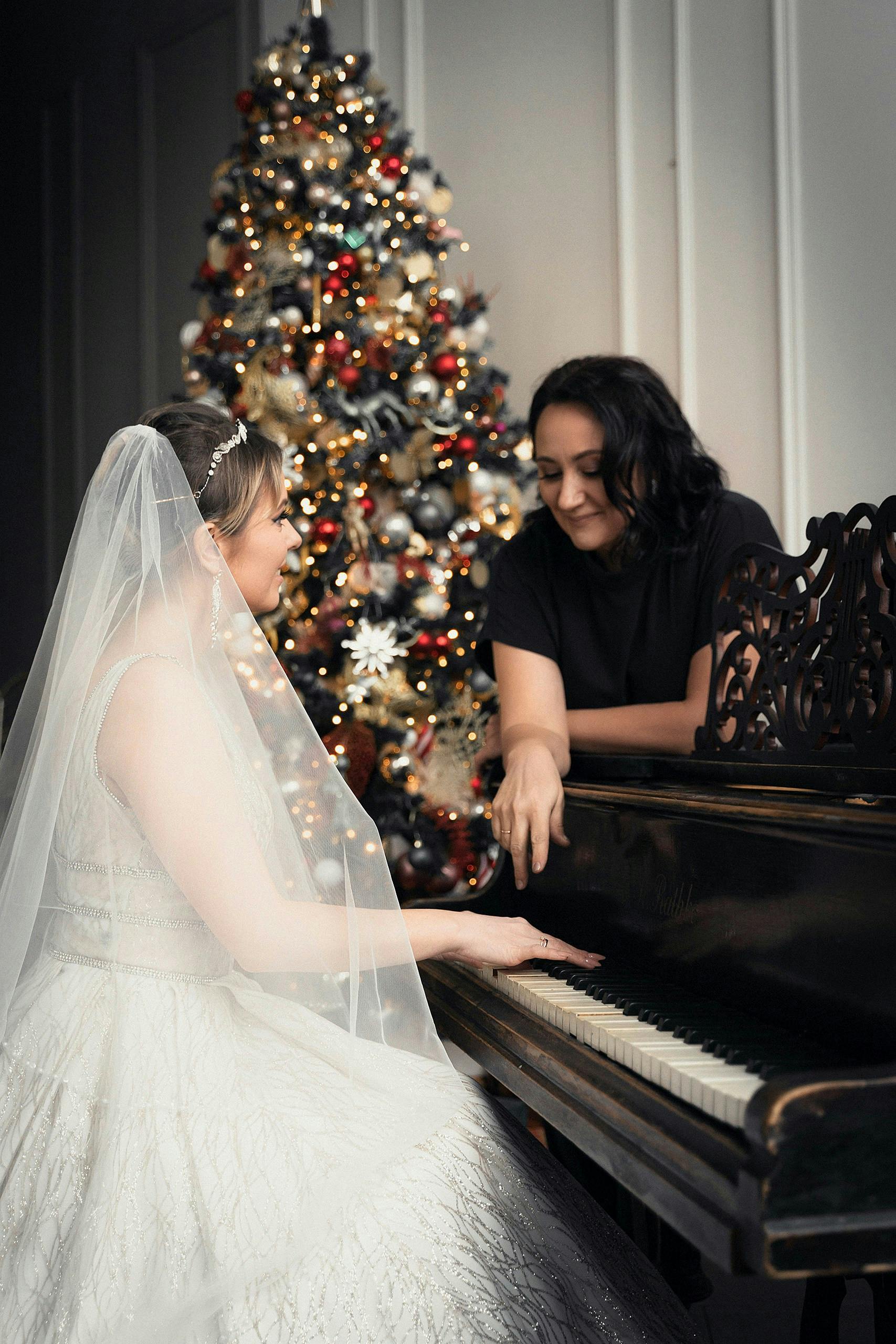 Bride Sitting and Playing the Piano · Free Stock Photo