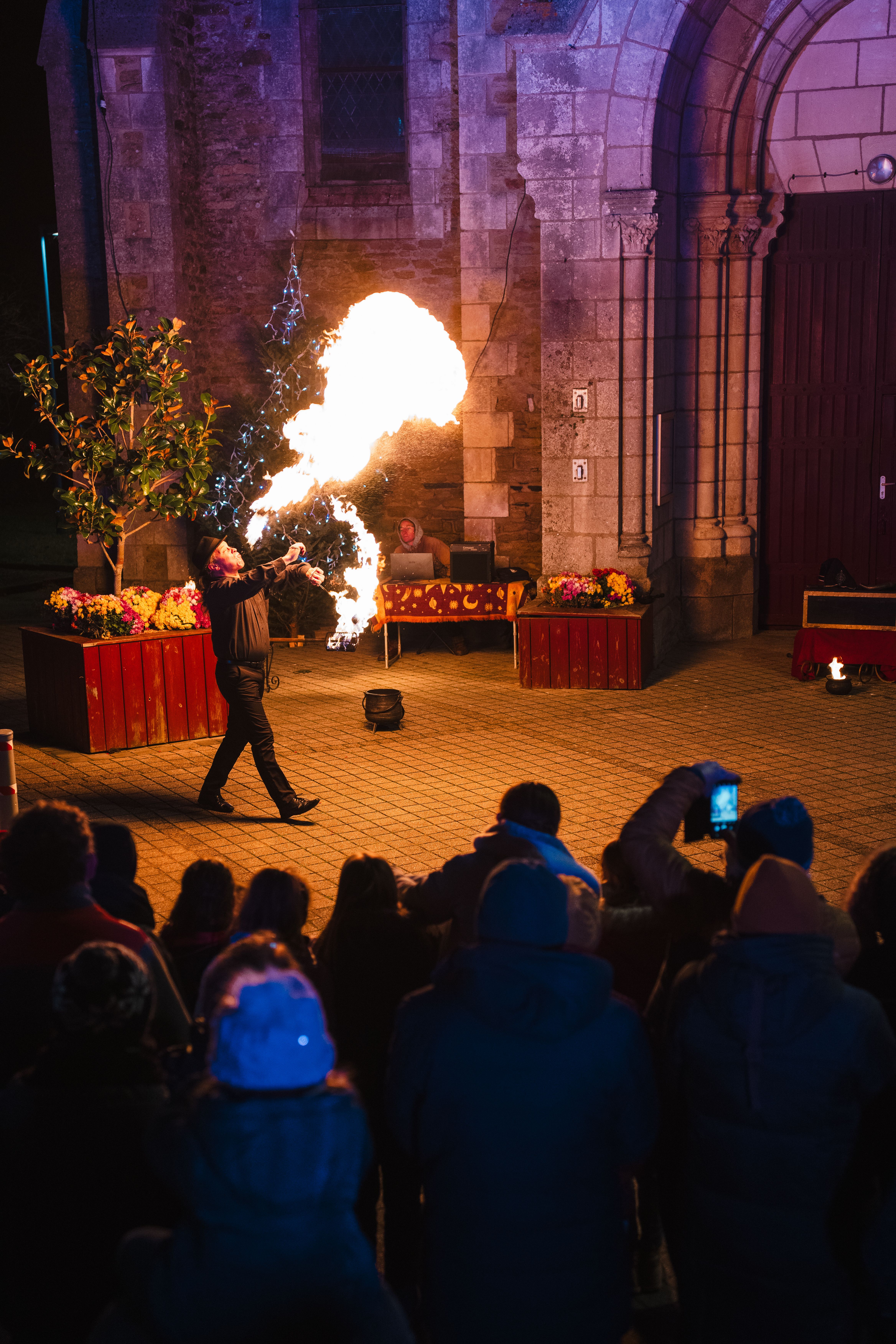Spectators Looking at a Performance of a Firebreather · Free Stock Photo