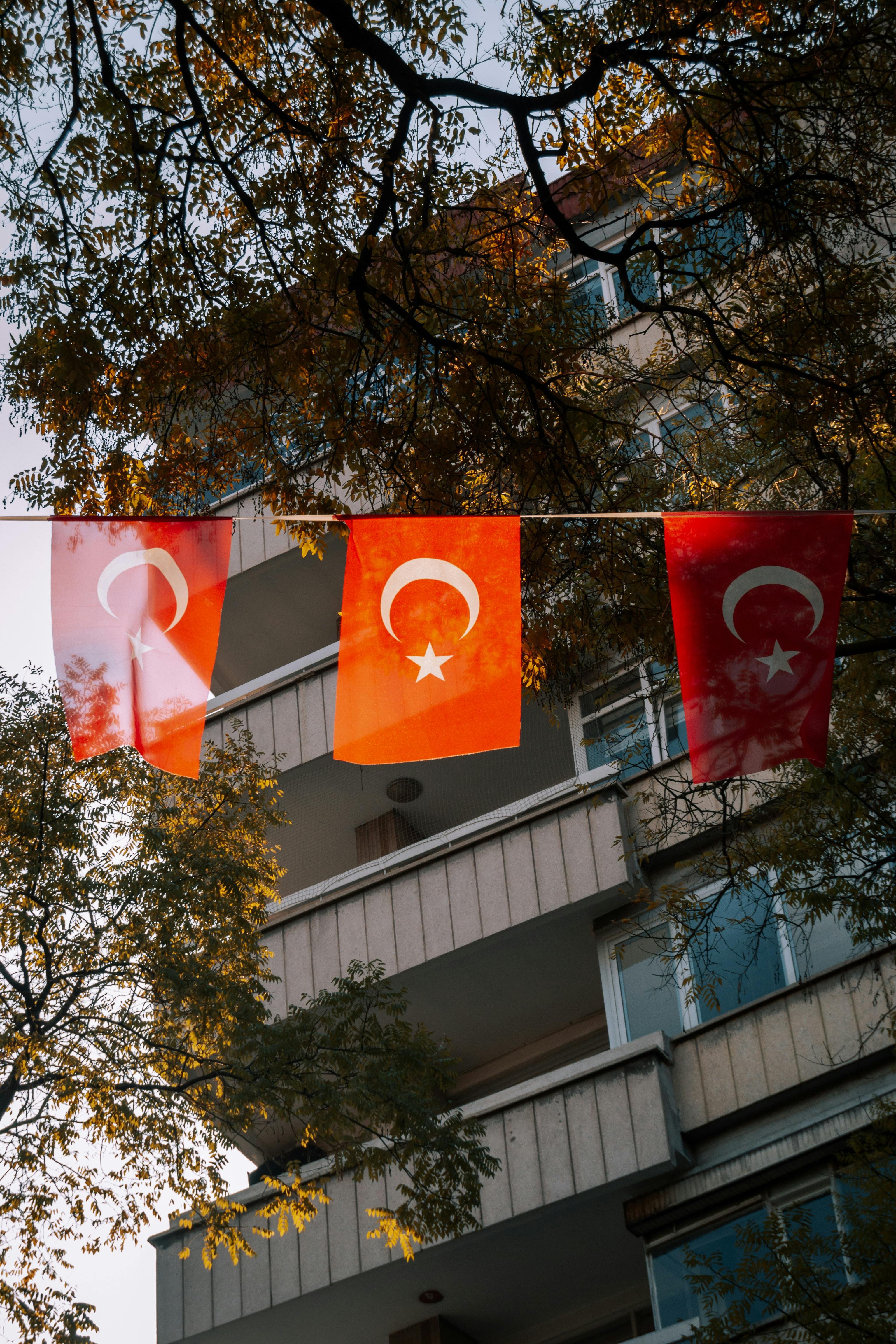 String of Turkish Flags in Front of an Apartment Building · Free Stock ...