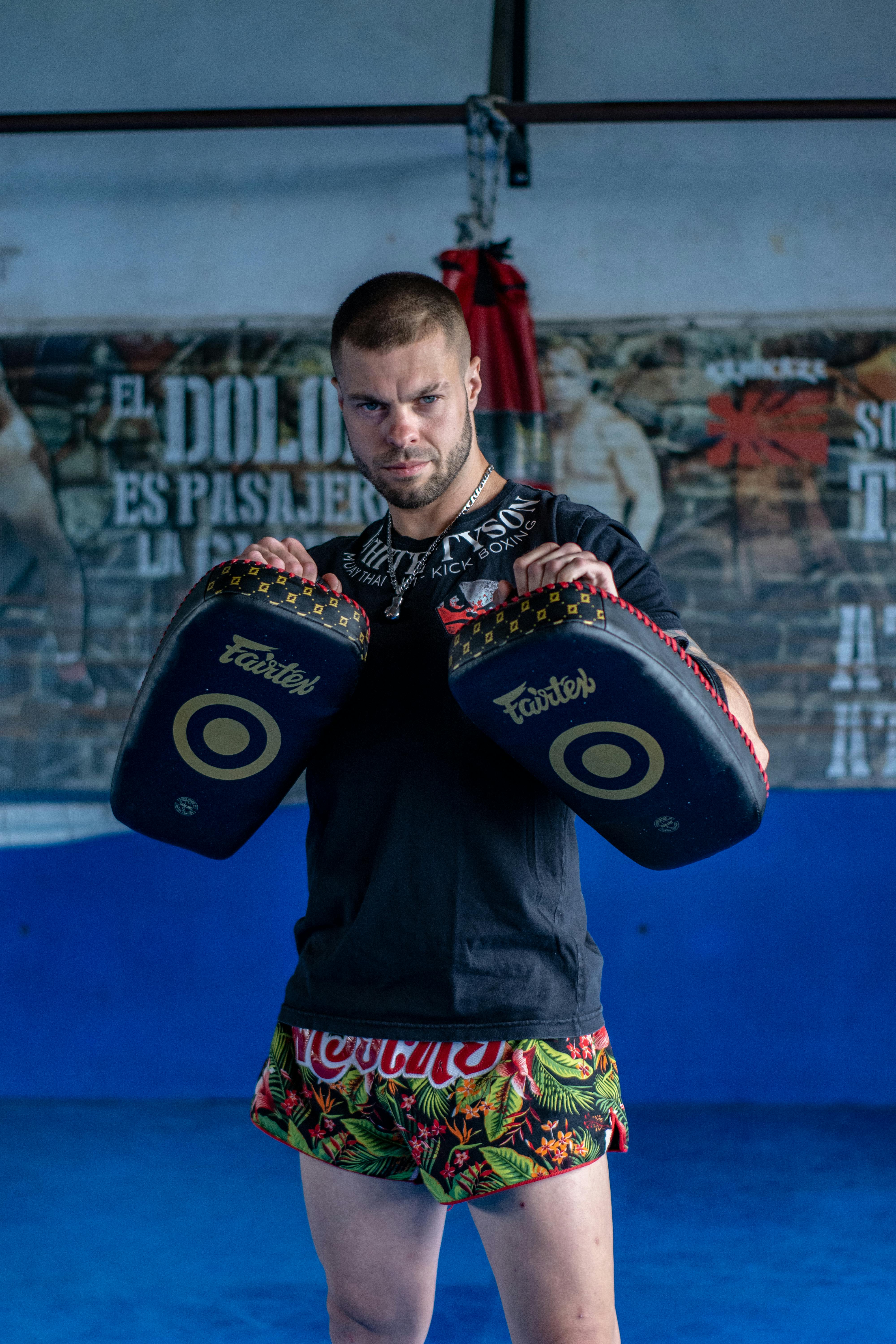 Man in the Gym with Boxing Training Equipment · Free Stock Photo