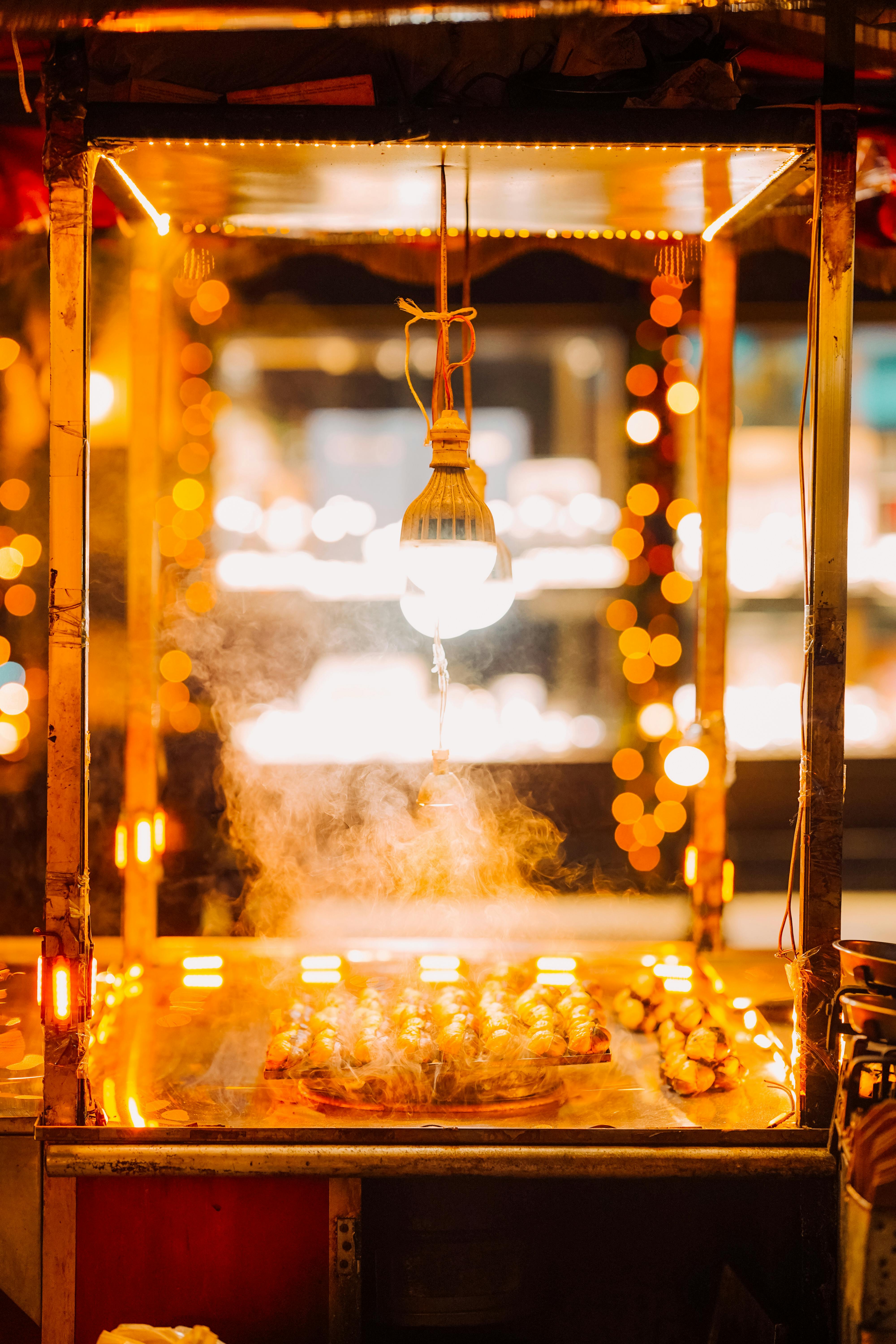Lights over Street Food Stand at Night · Free Stock Photo