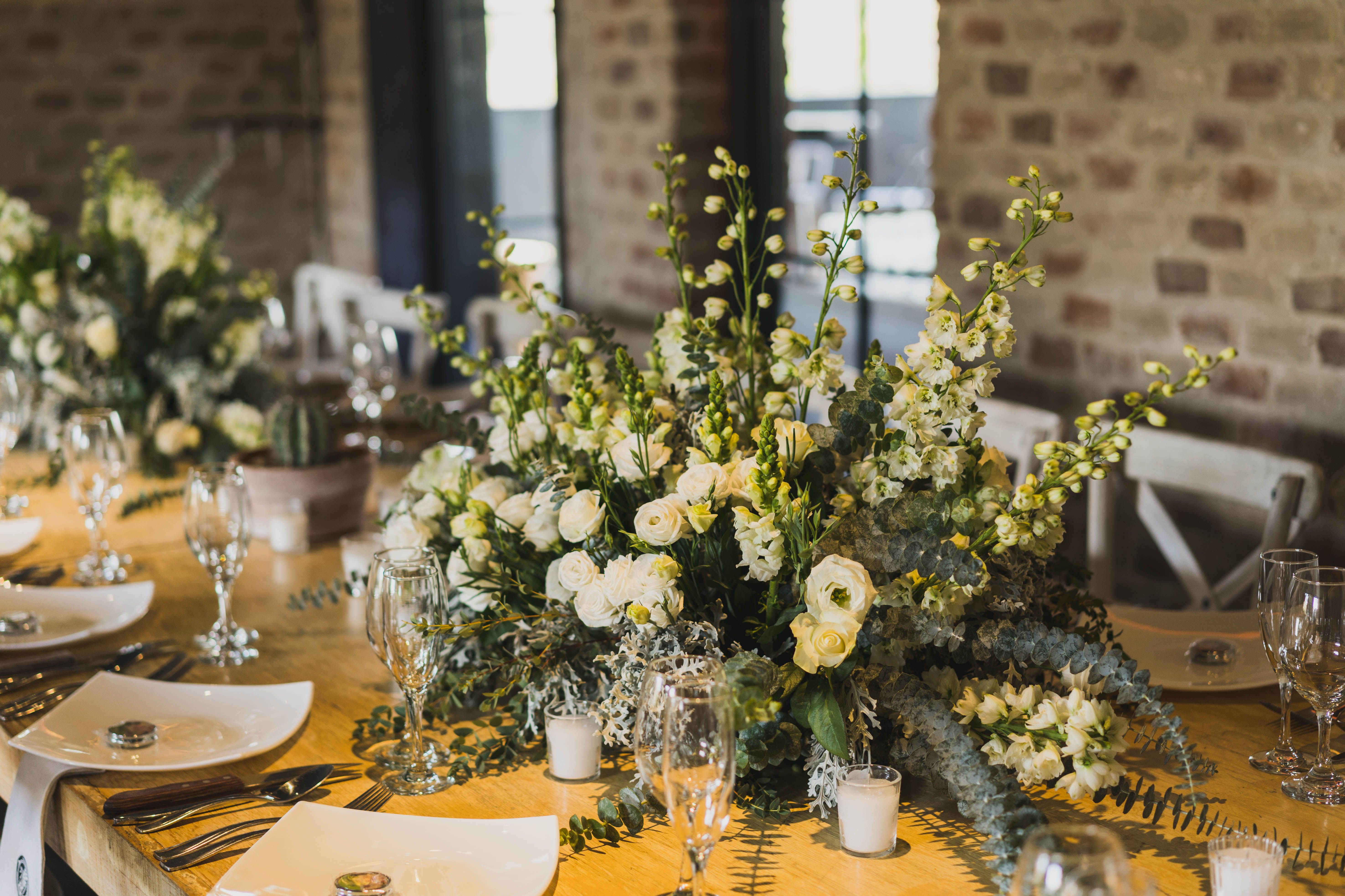 Flower Arrangements Standing on a Table at a Wedding Reception · Free ...