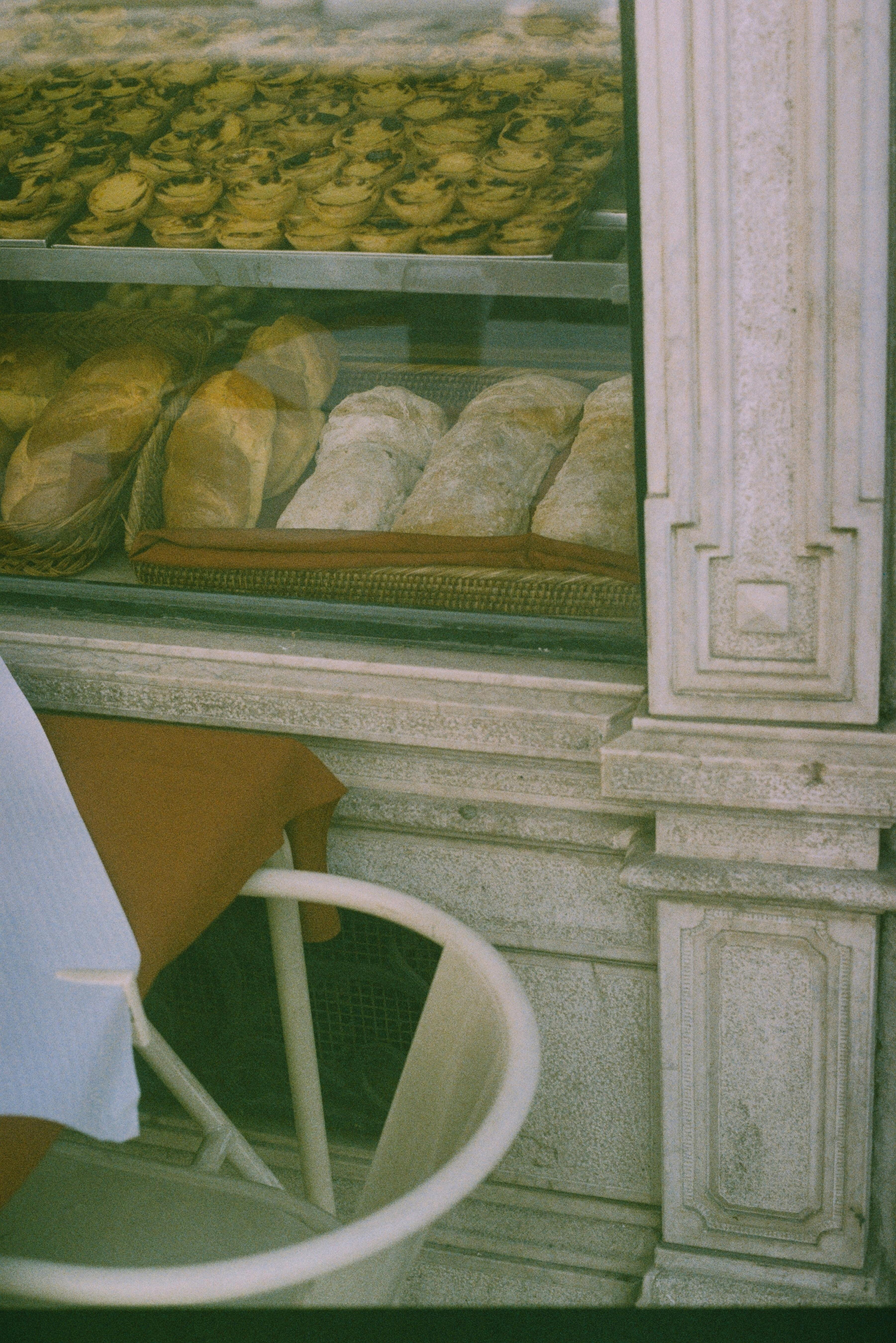 Bread behind Bakery Window · Free Stock Photo