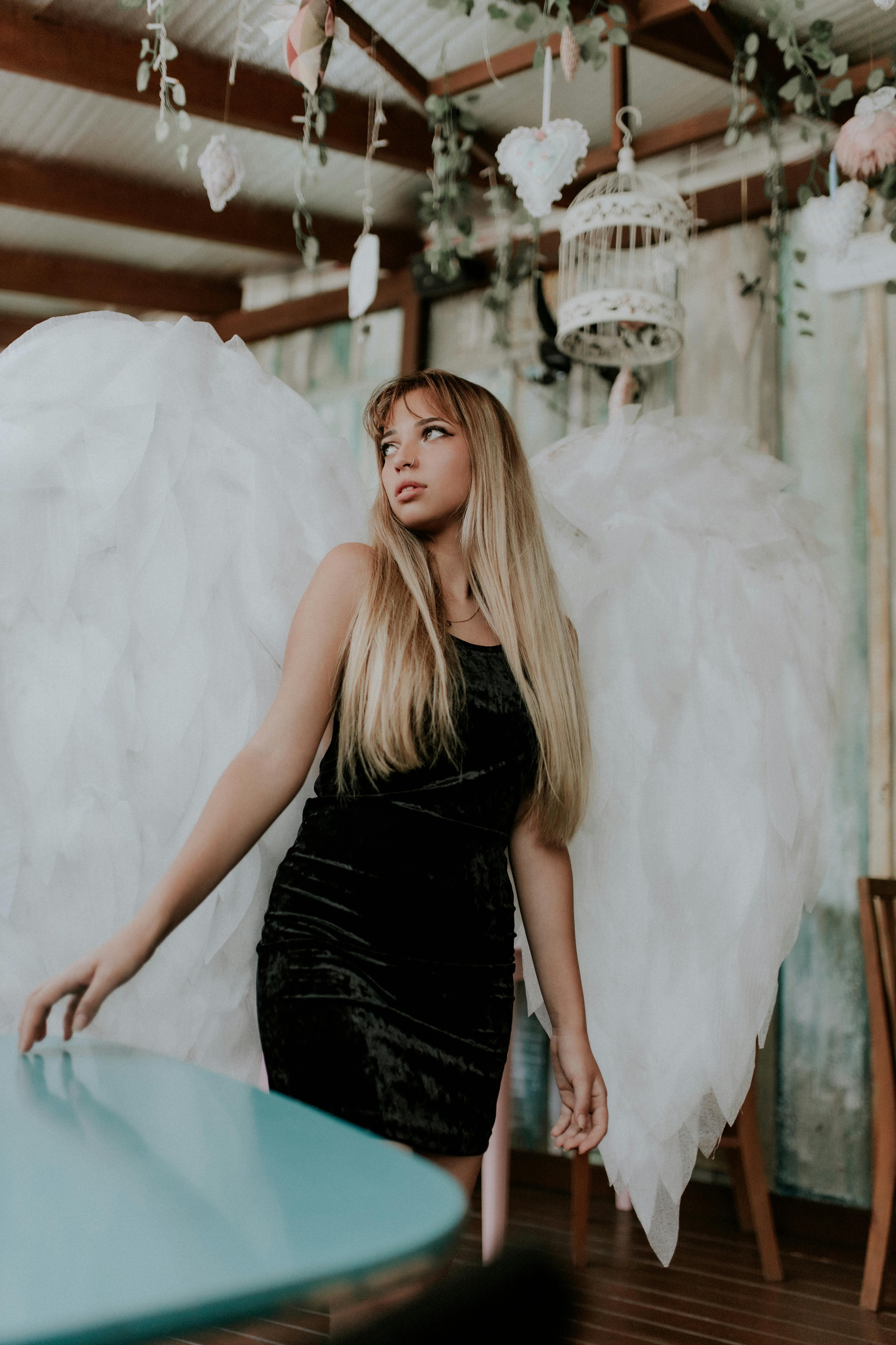 Woman in an Angel Costume · Free Stock Photo