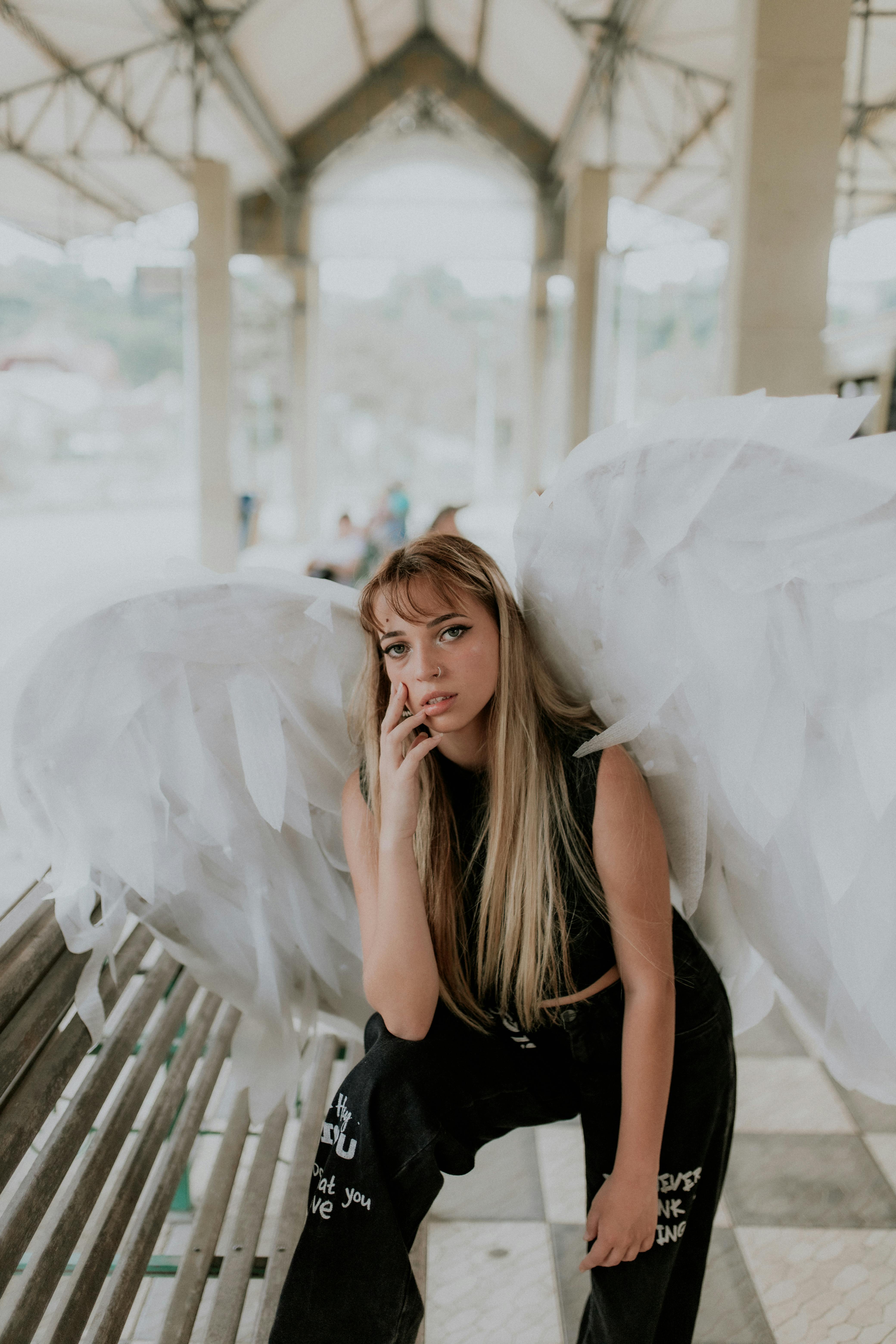 Portrait of a Female Model Wearing Angel Wings · Free Stock Photo