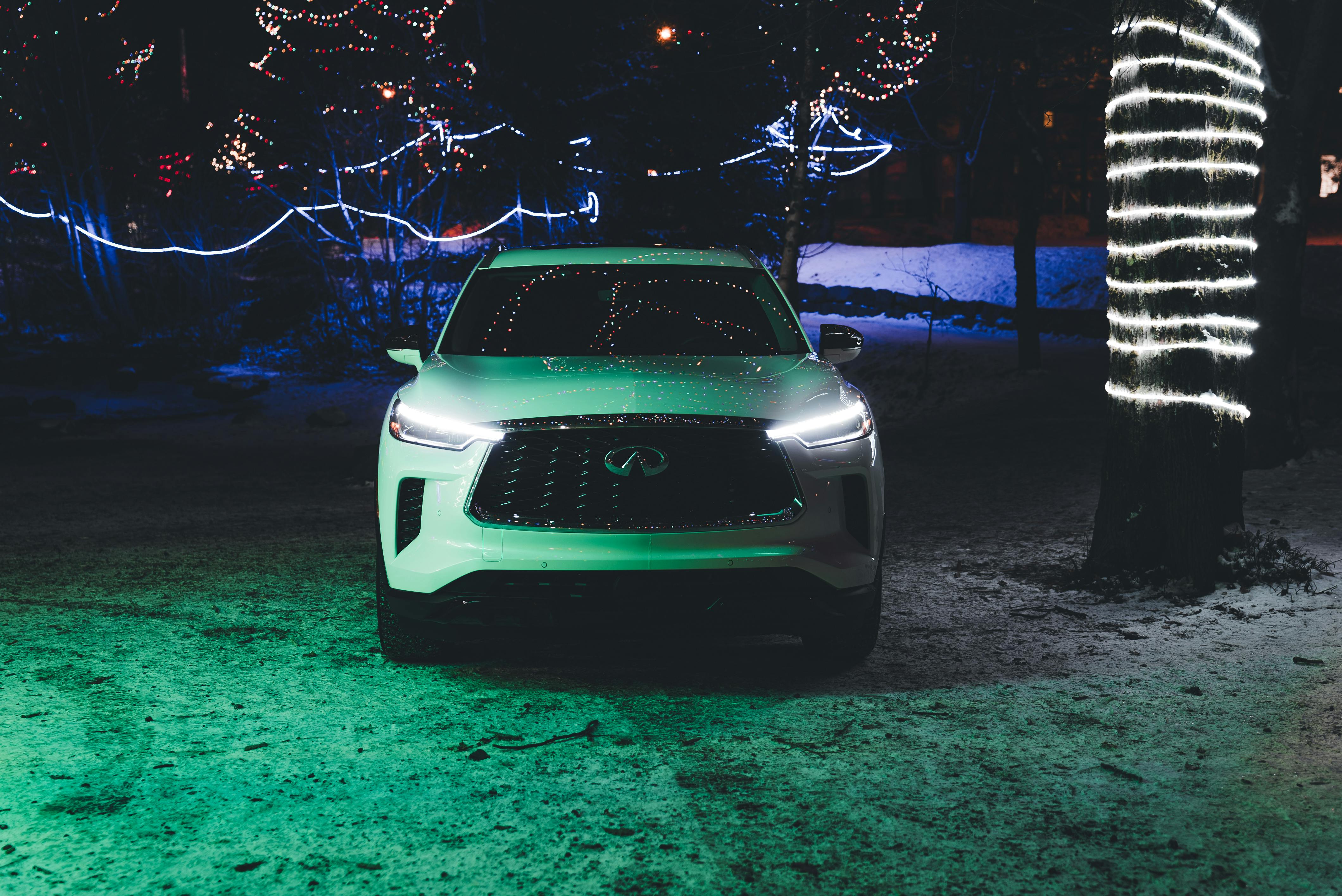 Christmas Lights over Infiniti QX60 at Night · Free Stock Photo