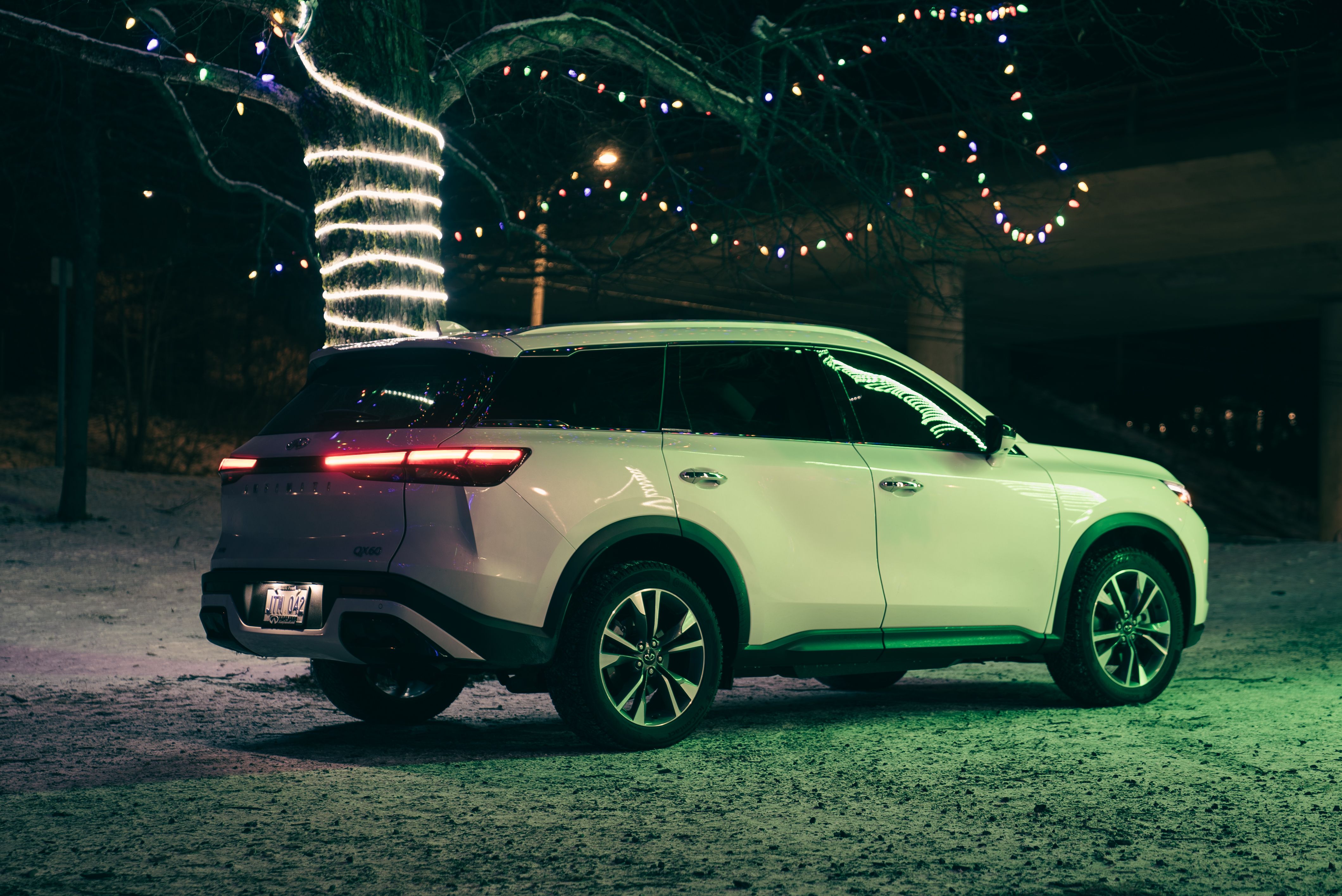 Infiniti QX60 by Decorated Tree at Night · Free Stock Photo