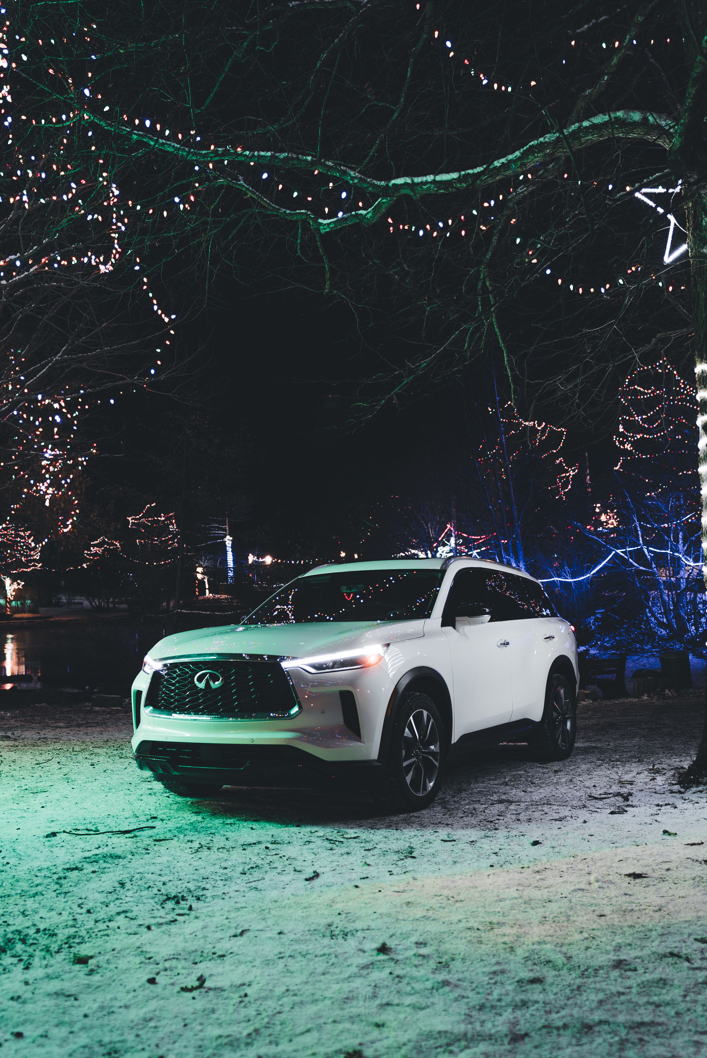 White 22 Infiniti QX60 SUV Illuminated by Christmas Lights · Free Stock ...