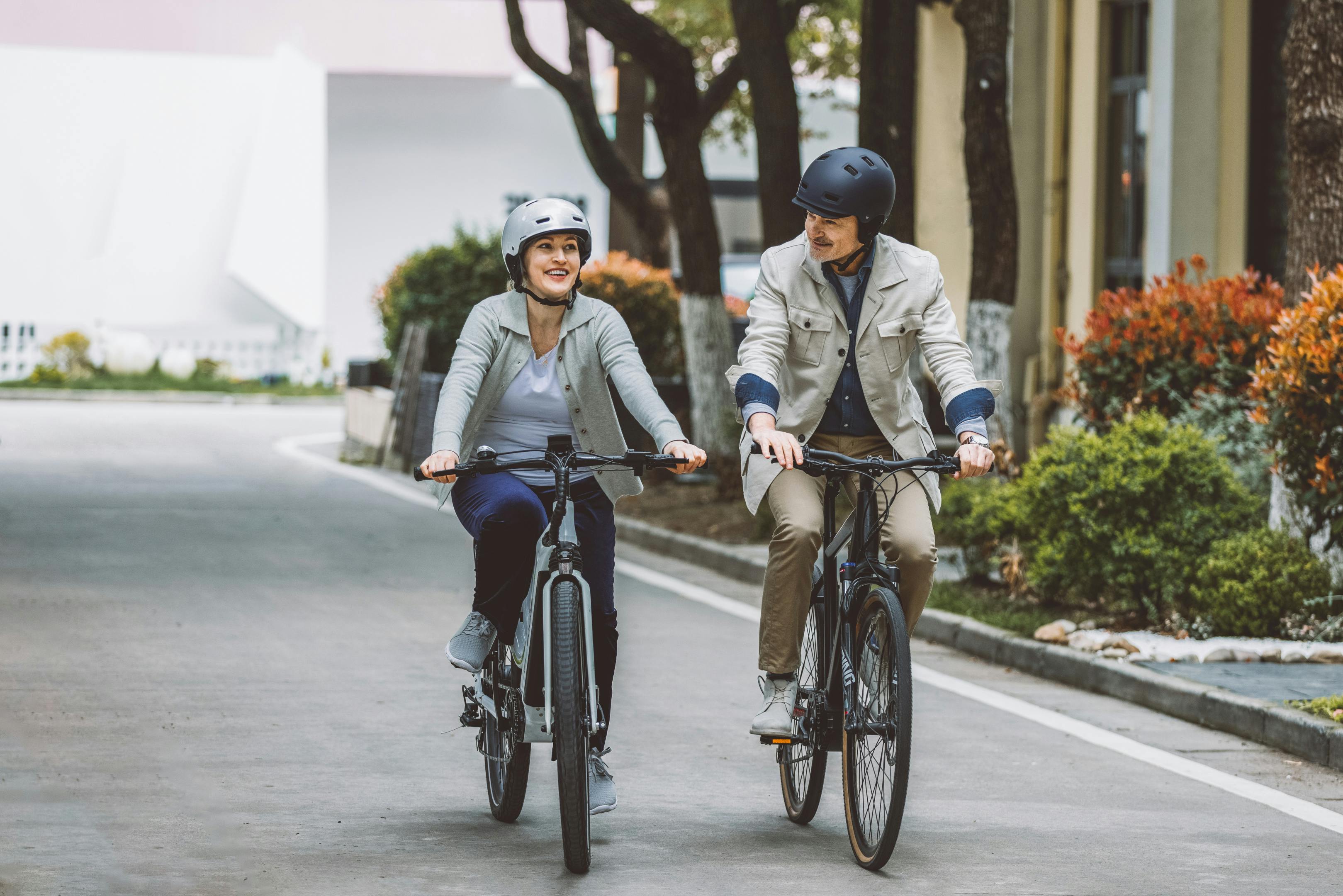 Photo of a Couple Cycling Together · Free Stock Photo