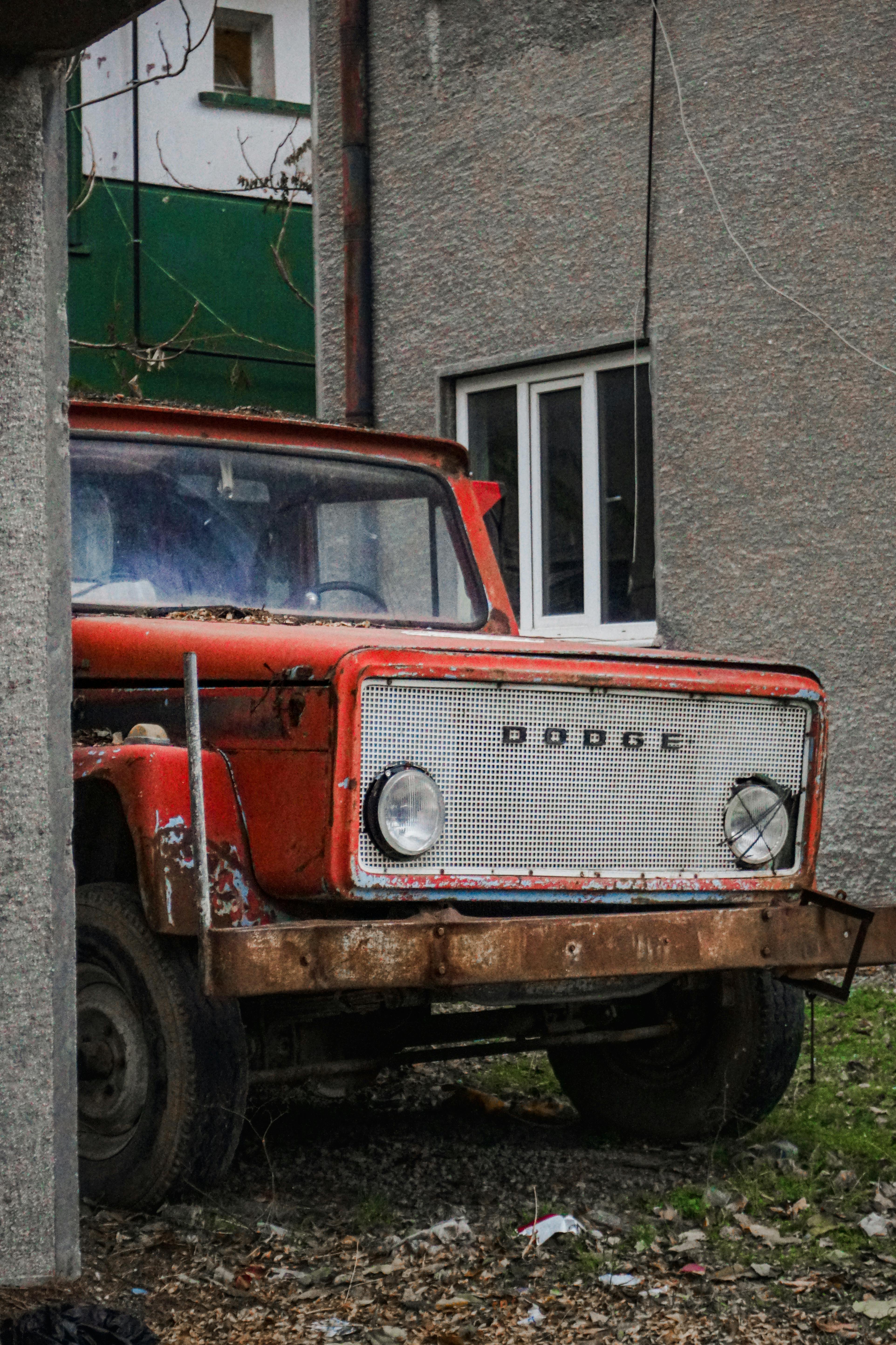 Old Red Dodge Parked Outside · Free Stock Photo