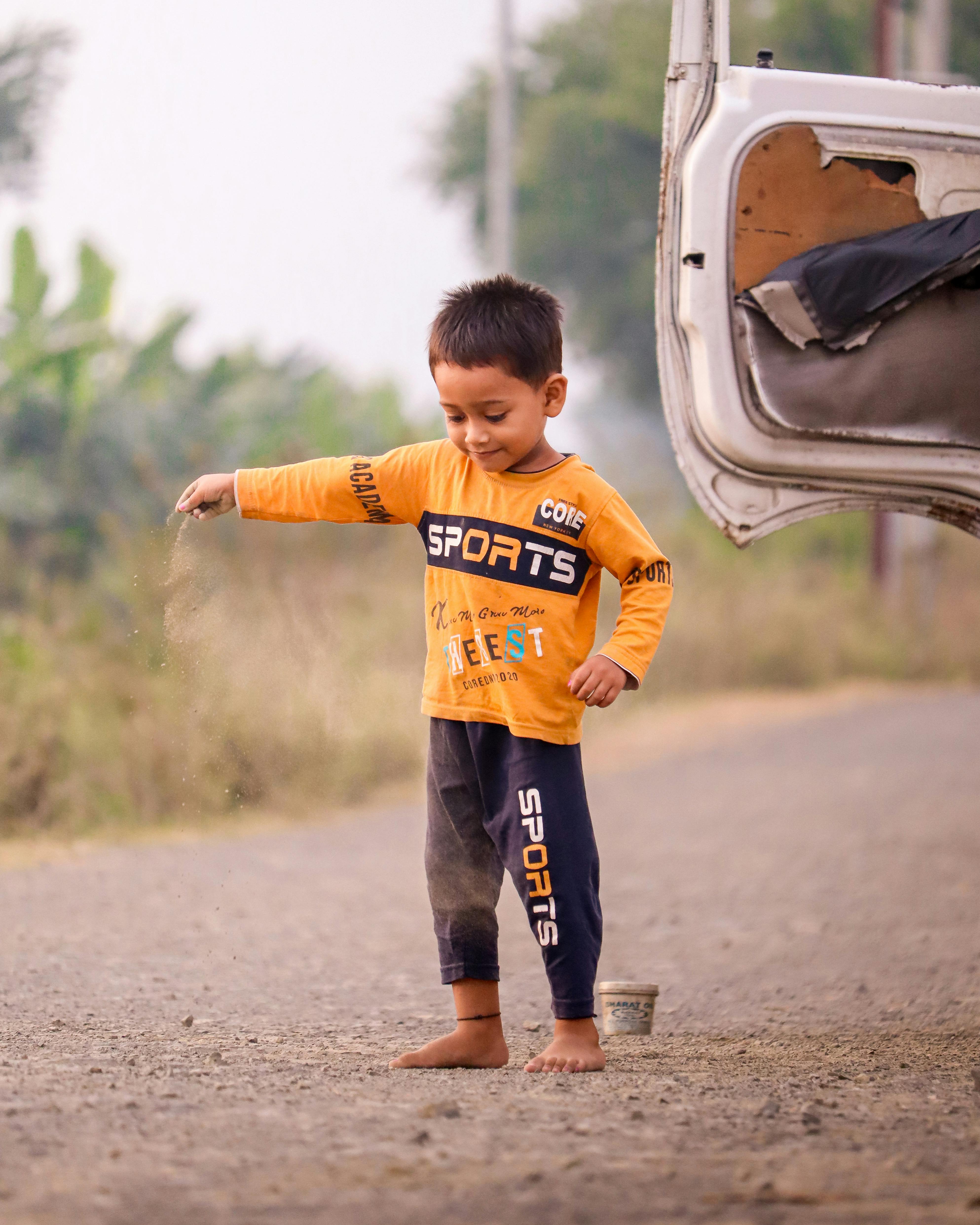 Boy Playing on Road · Free Stock Photo