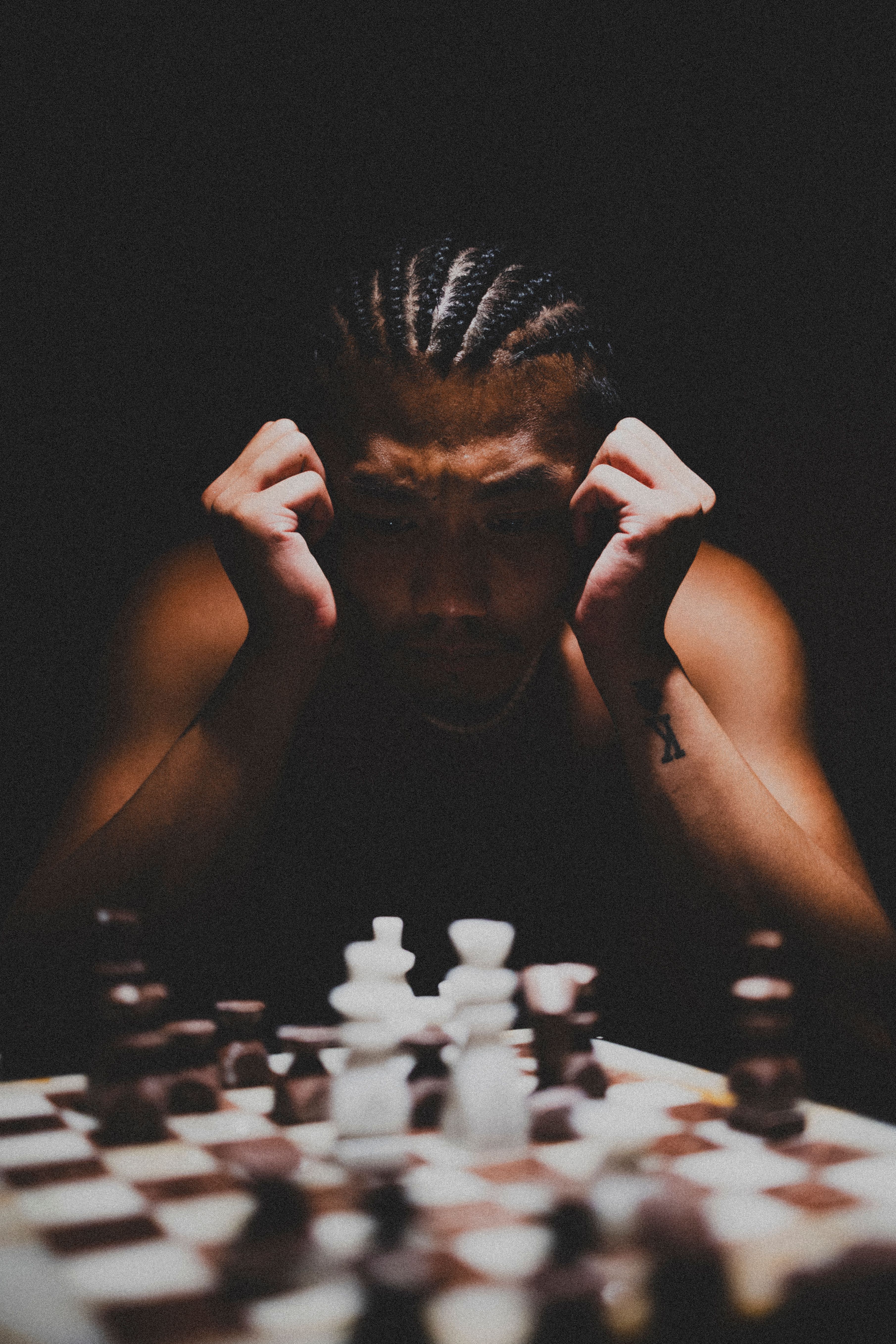 Man Playing Chess in Shadow · Free Stock Photo