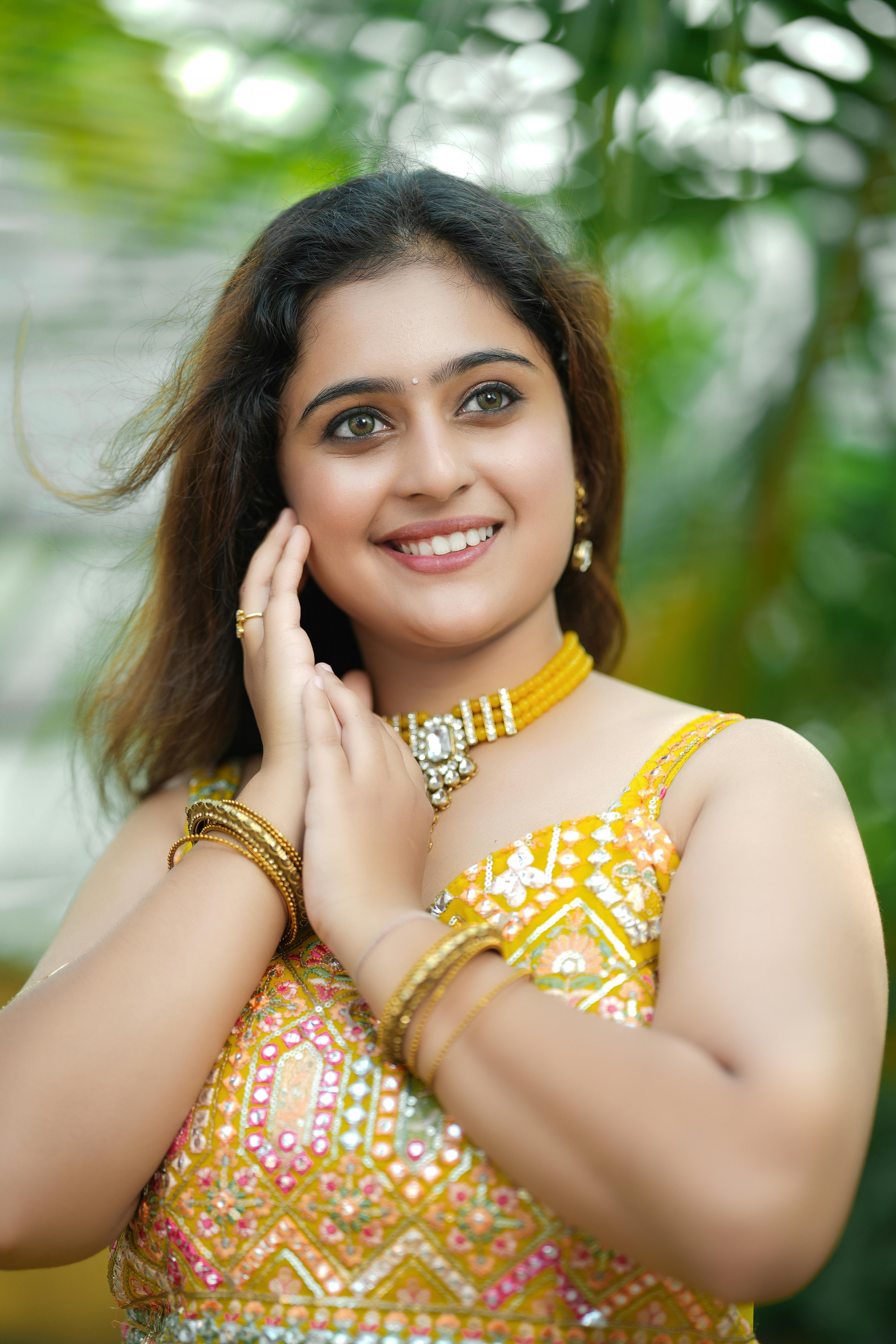 A Woman Wearing Jewelry · Free Stock Photo