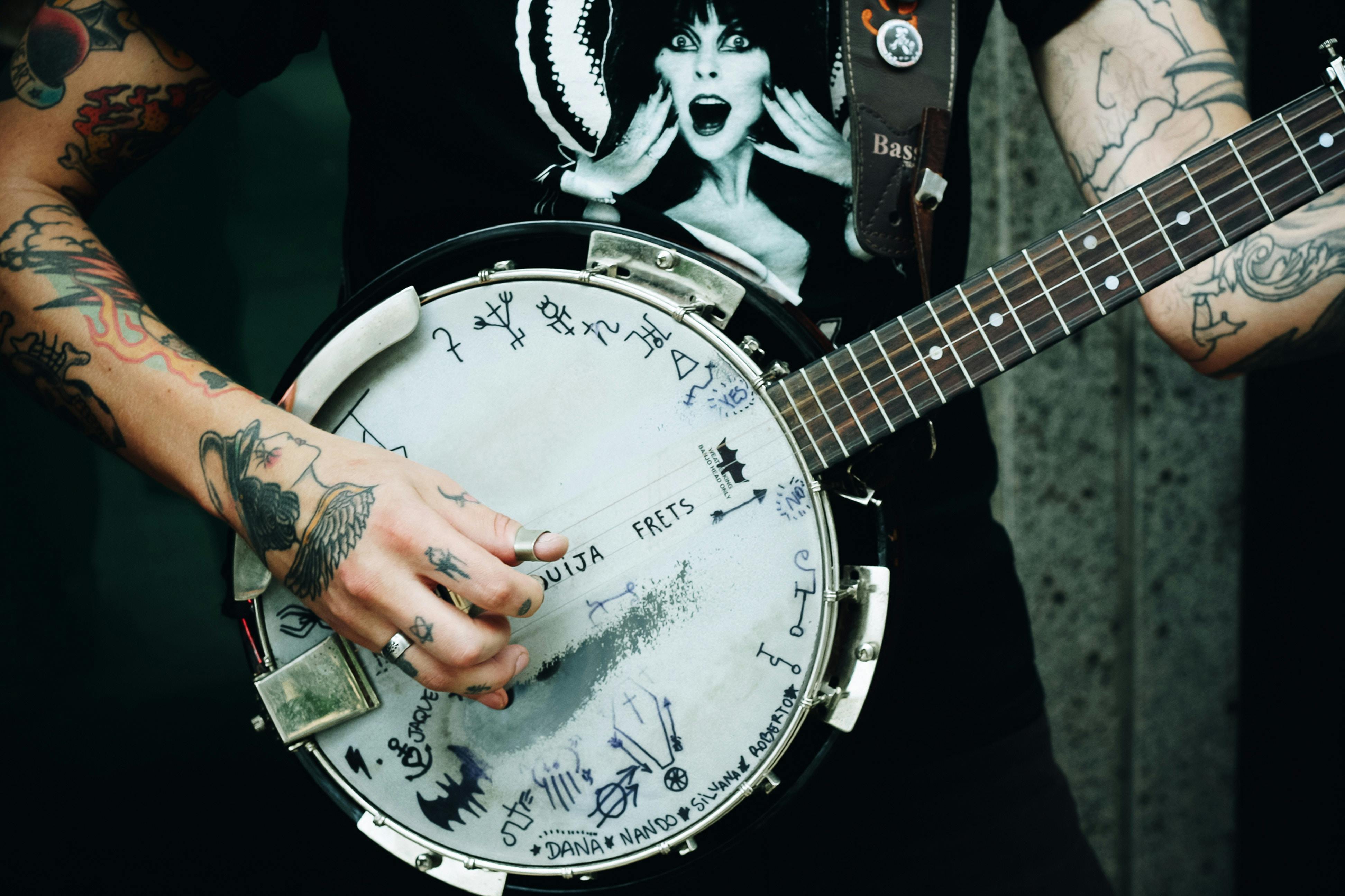 Person Holding Banjo · Free Stock Photo