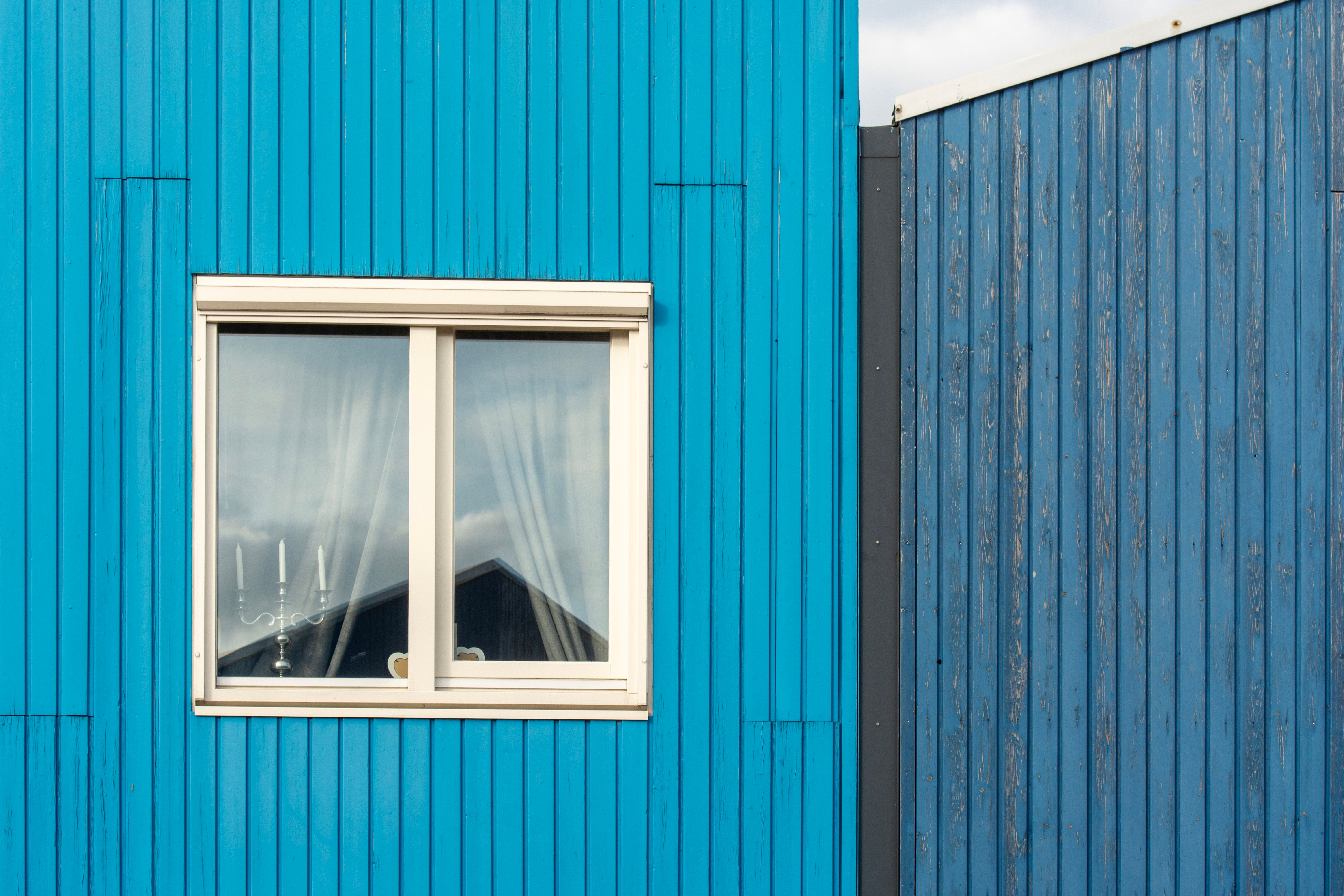 Blue Facade of Residential Buildings · Free Stock Photo