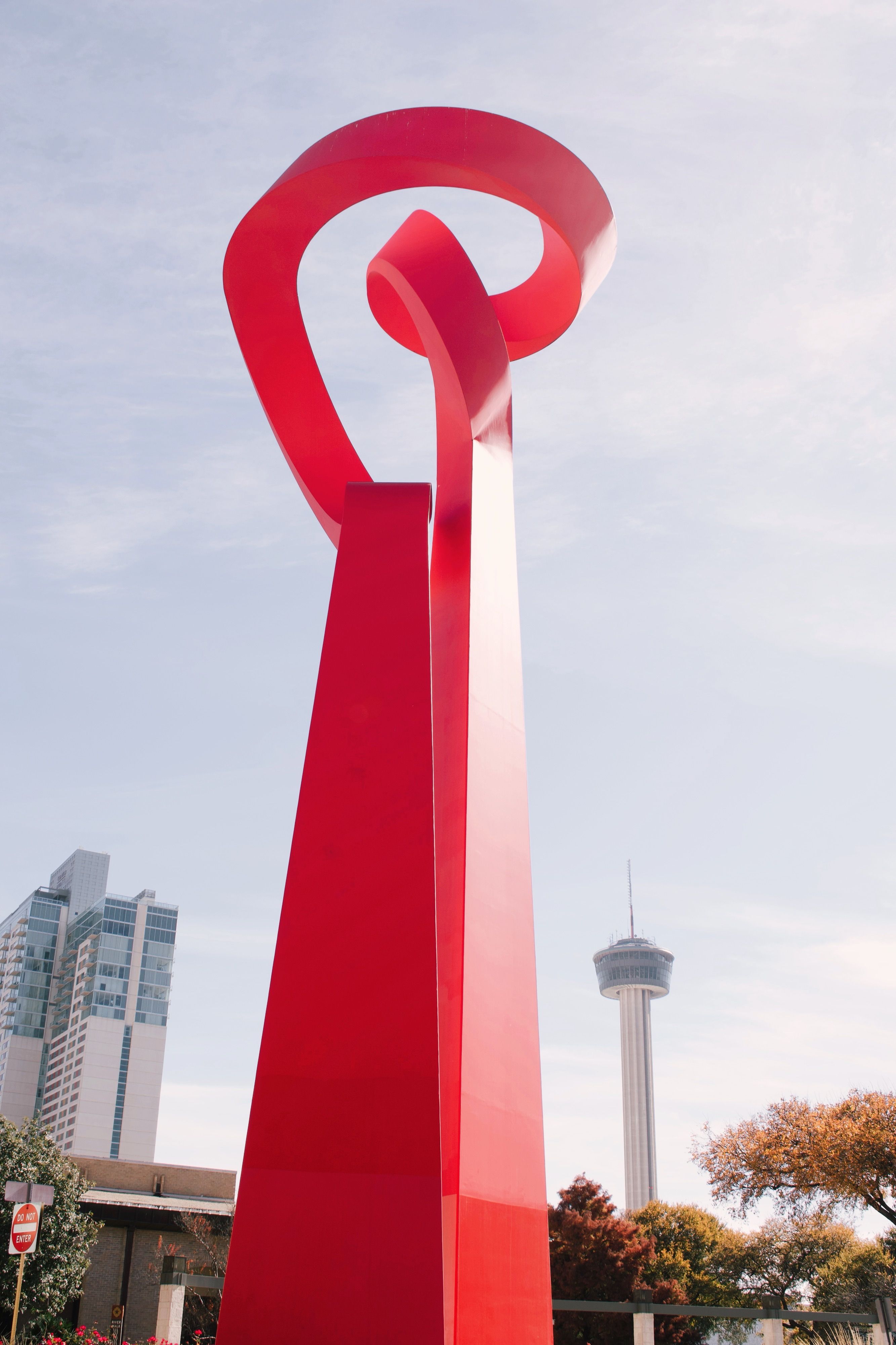 Red Modern Sculpture in a City · Free Stock Photo