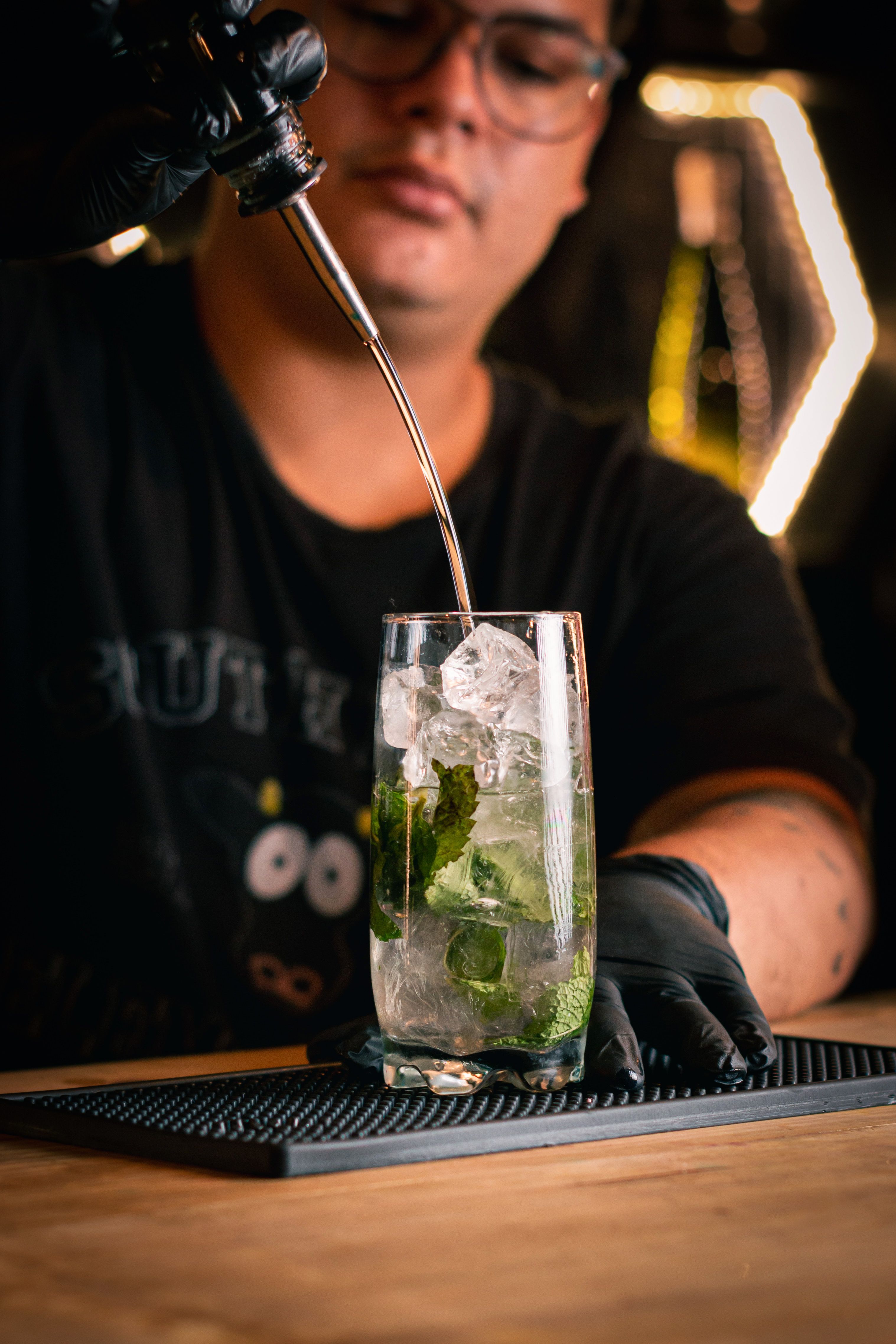 A Person Making a Cocktail · Free Stock Photo