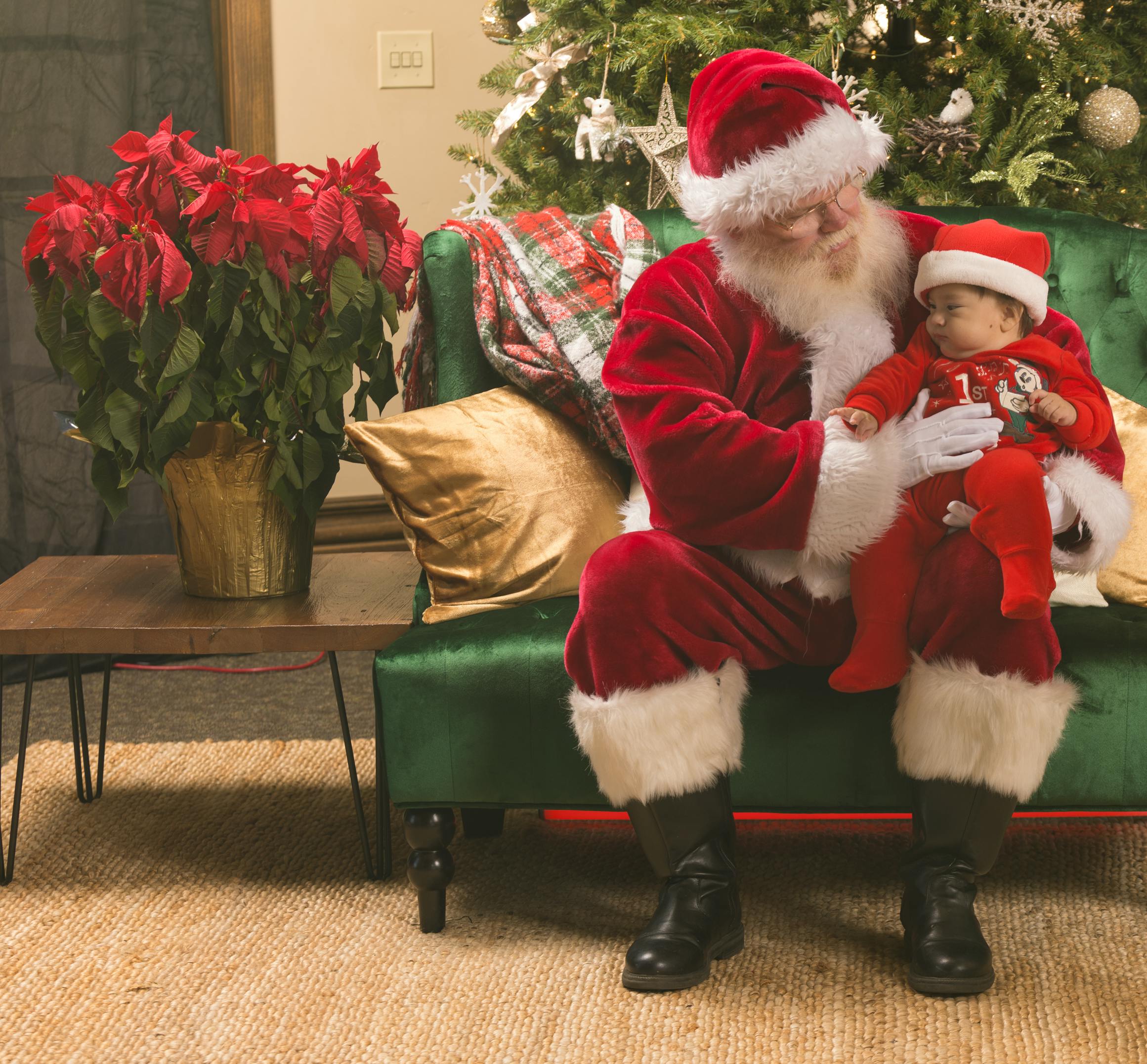 Little Girl Whispering into Santa Ear · Free Stock Photo