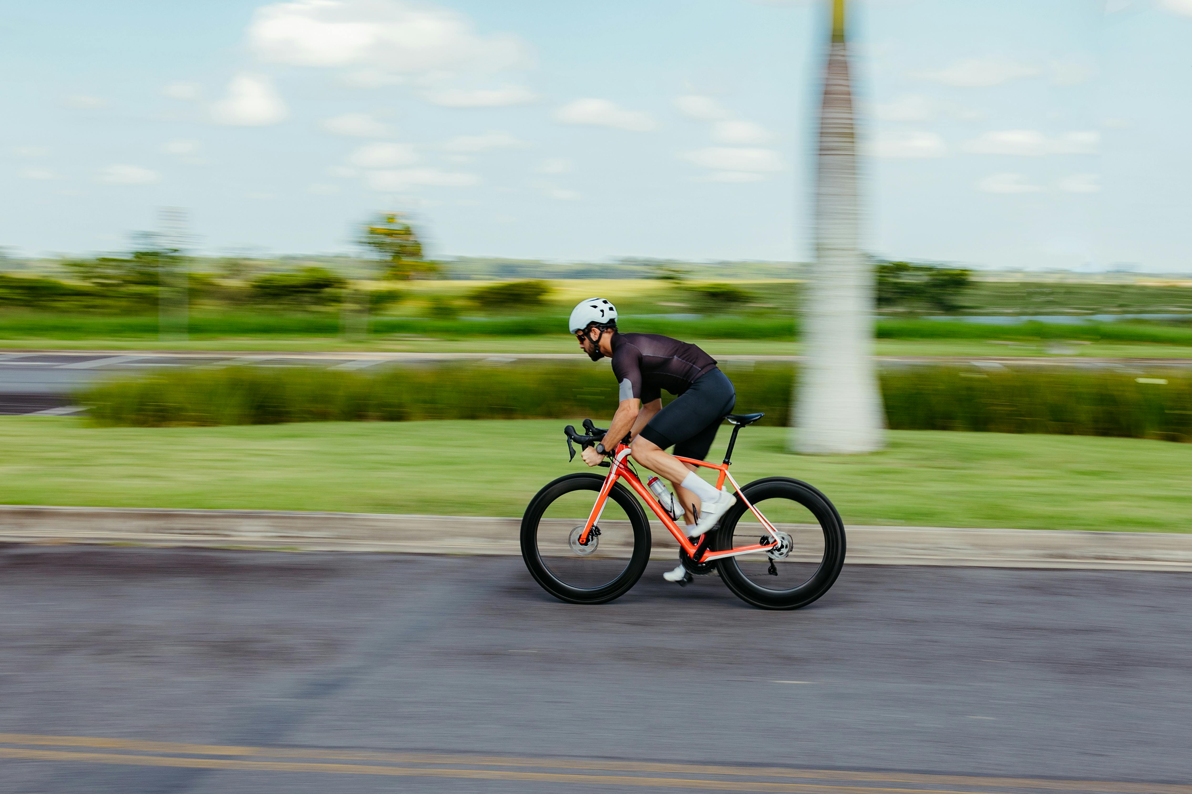 Silhouette of Person Riding on Commuter Bike · Free Stock Photo