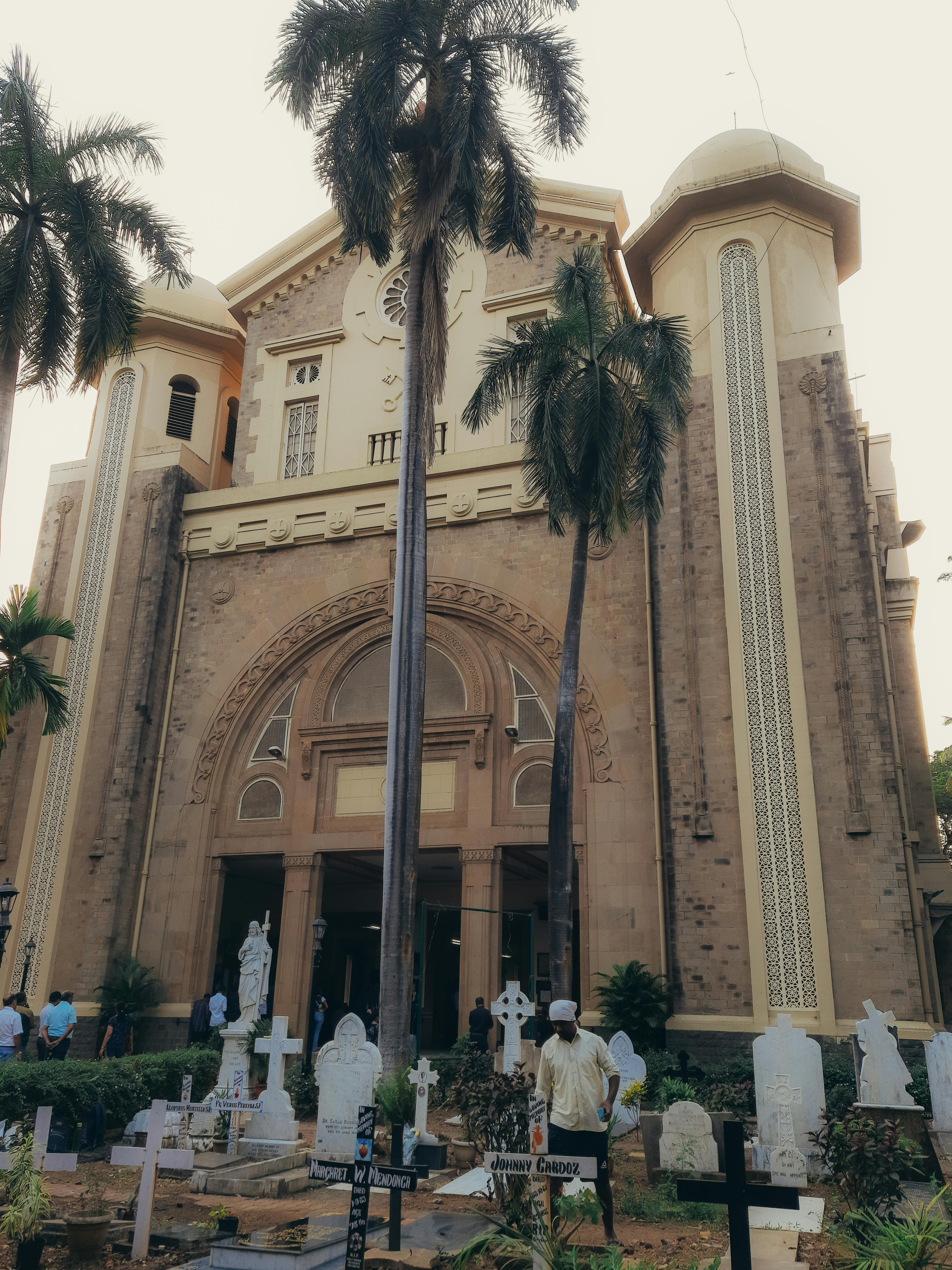 Palms in Front of a Church in Mumbai · Free Stock Photo