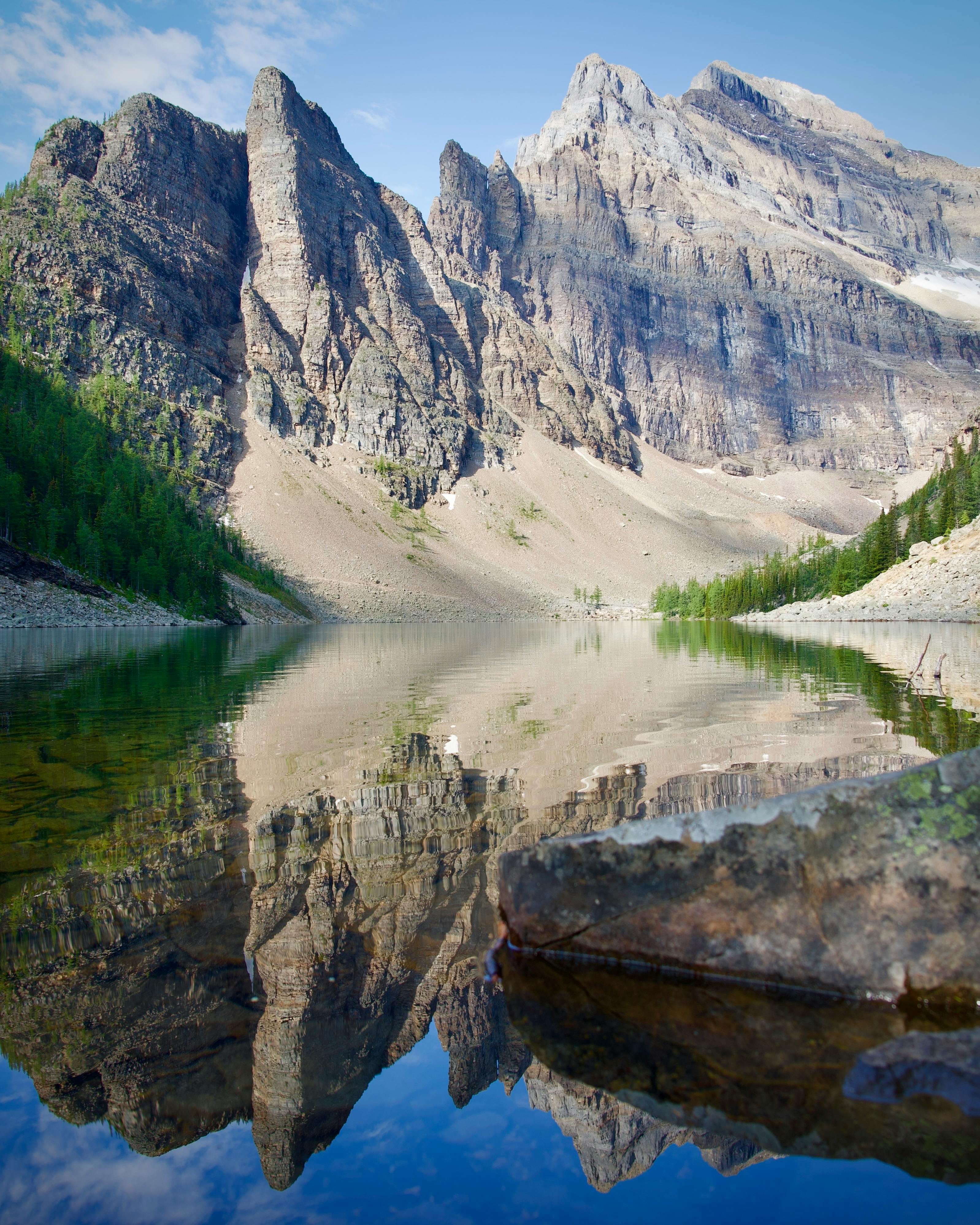 Rocky Mountains with Lake in Valley · Free Stock Photo