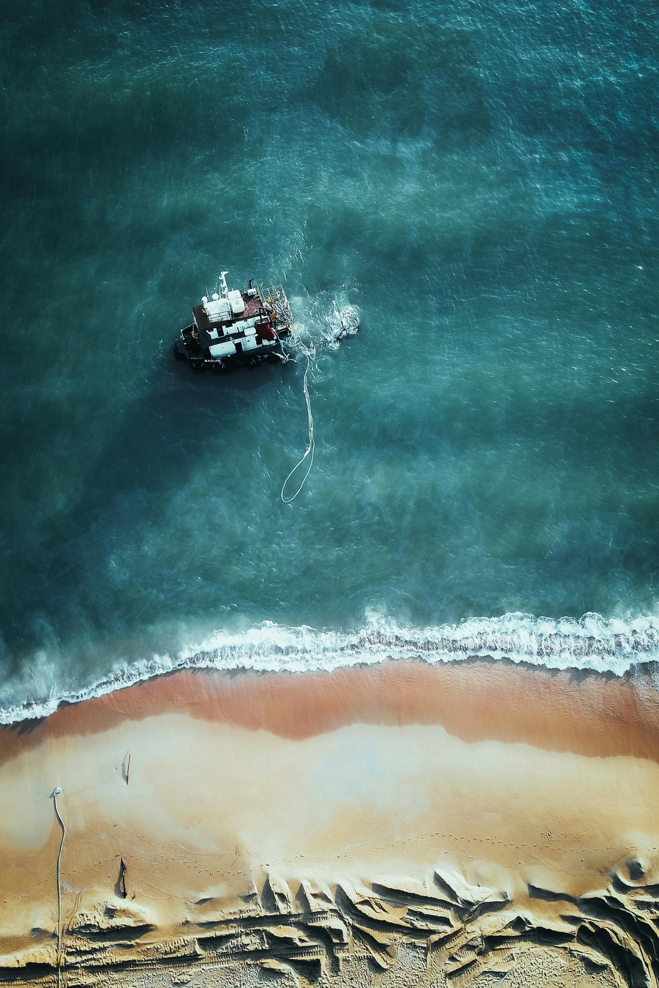 Top View Photo of Sea Waves and Dock · Free Stock Photo