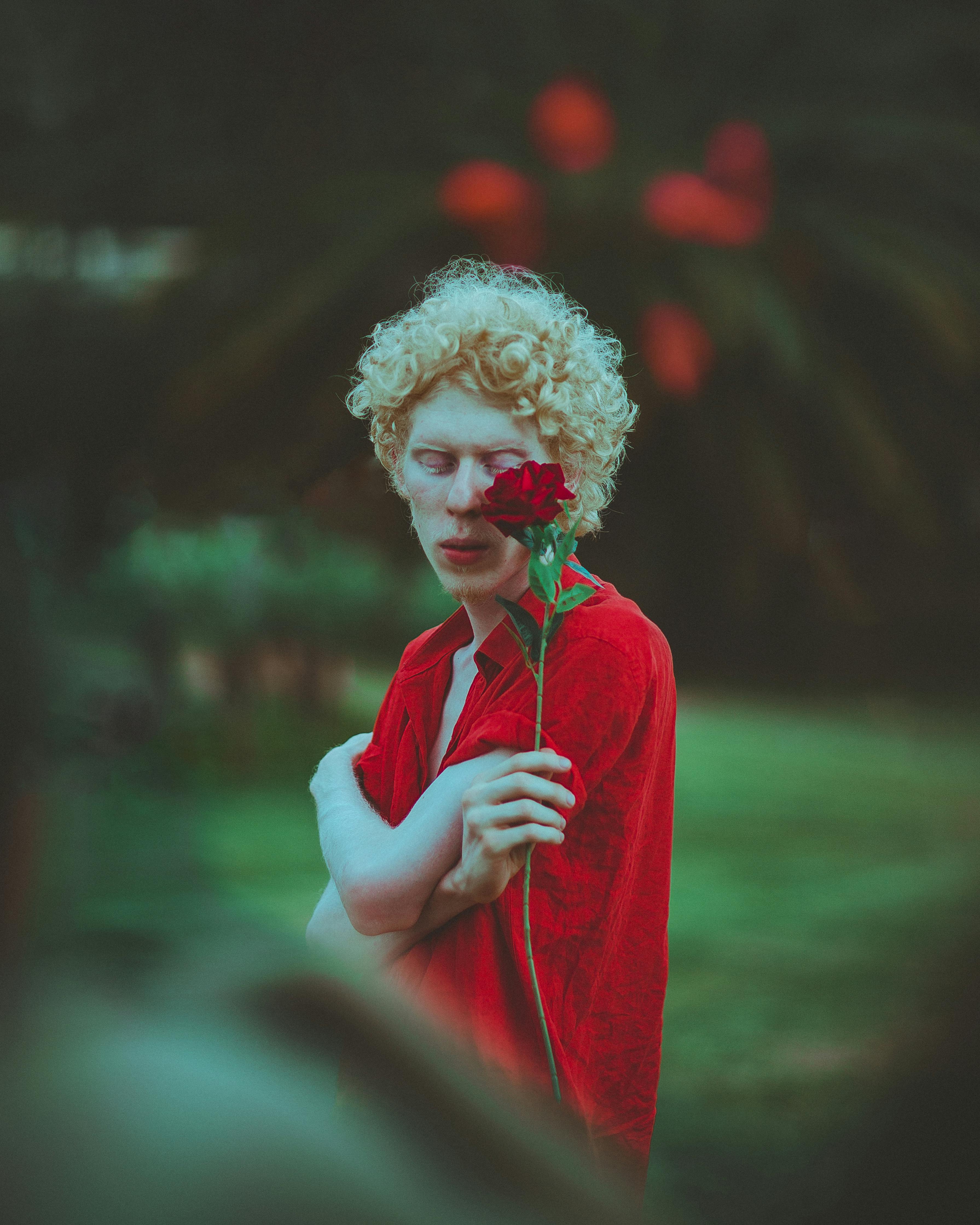 Man Holding Red Rose · Free Stock Photo