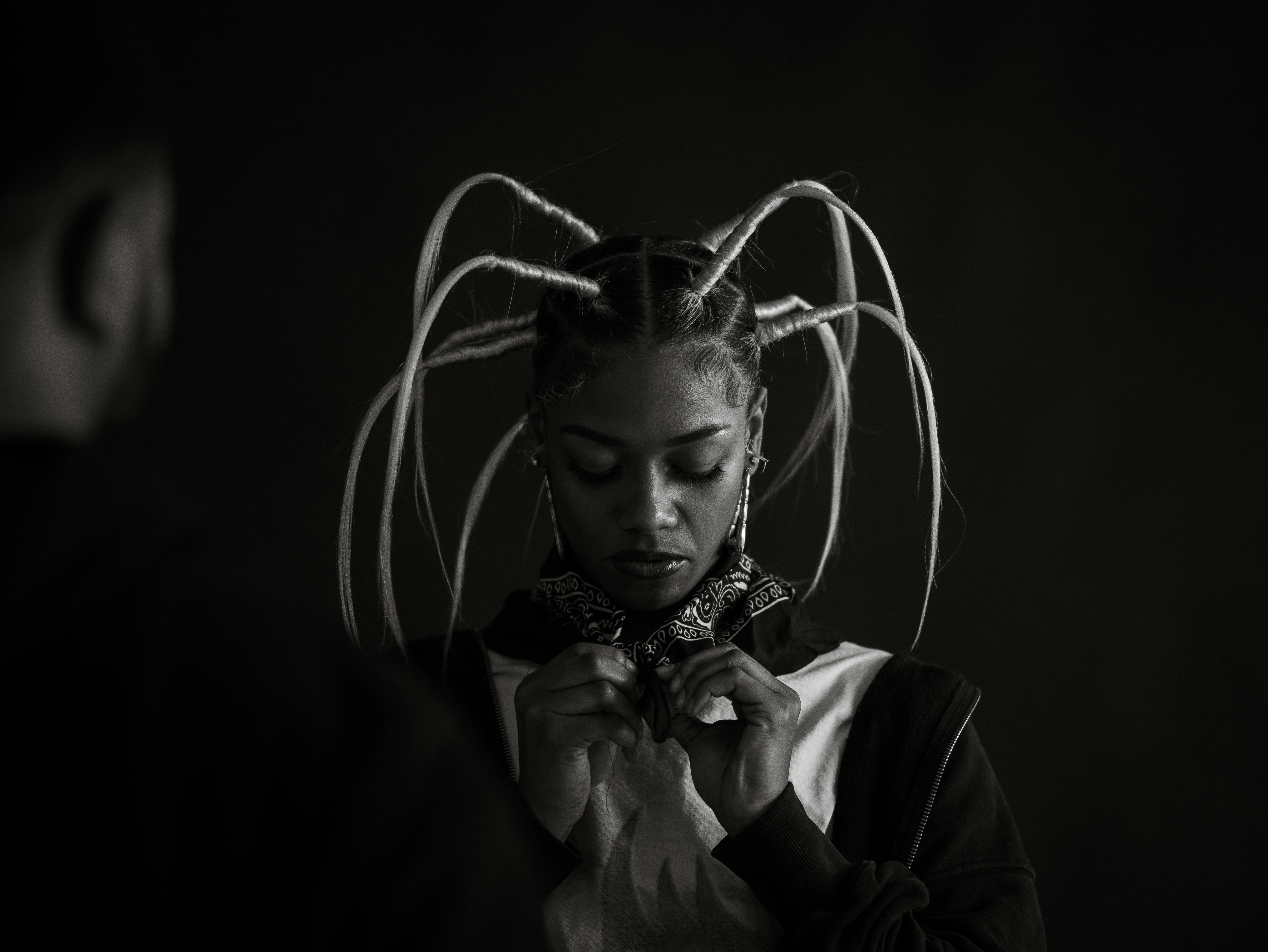 A woman with dreadlocks and a man with a tie · Free Stock Photo