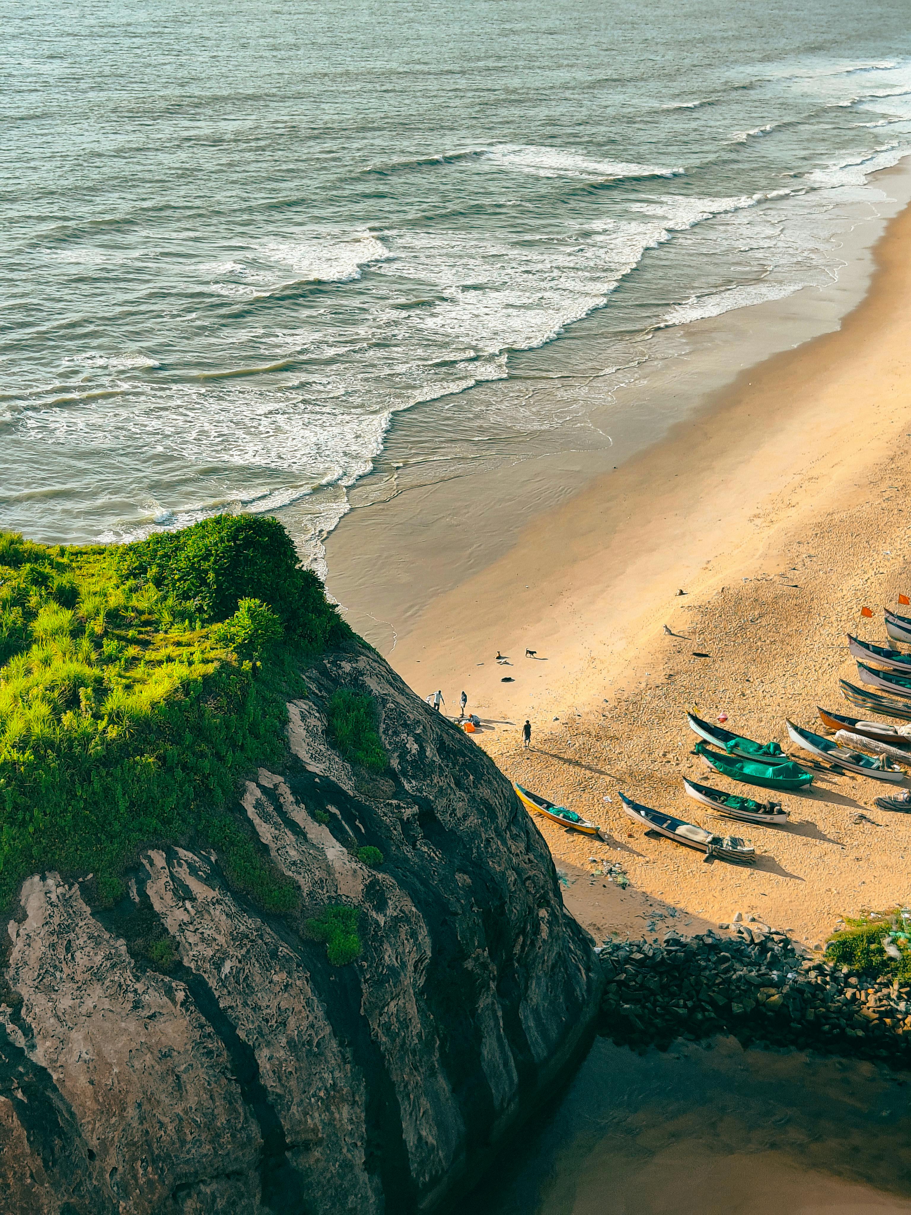 Aerial View of a Hill and Beach by the Ocean · Free Stock Photo