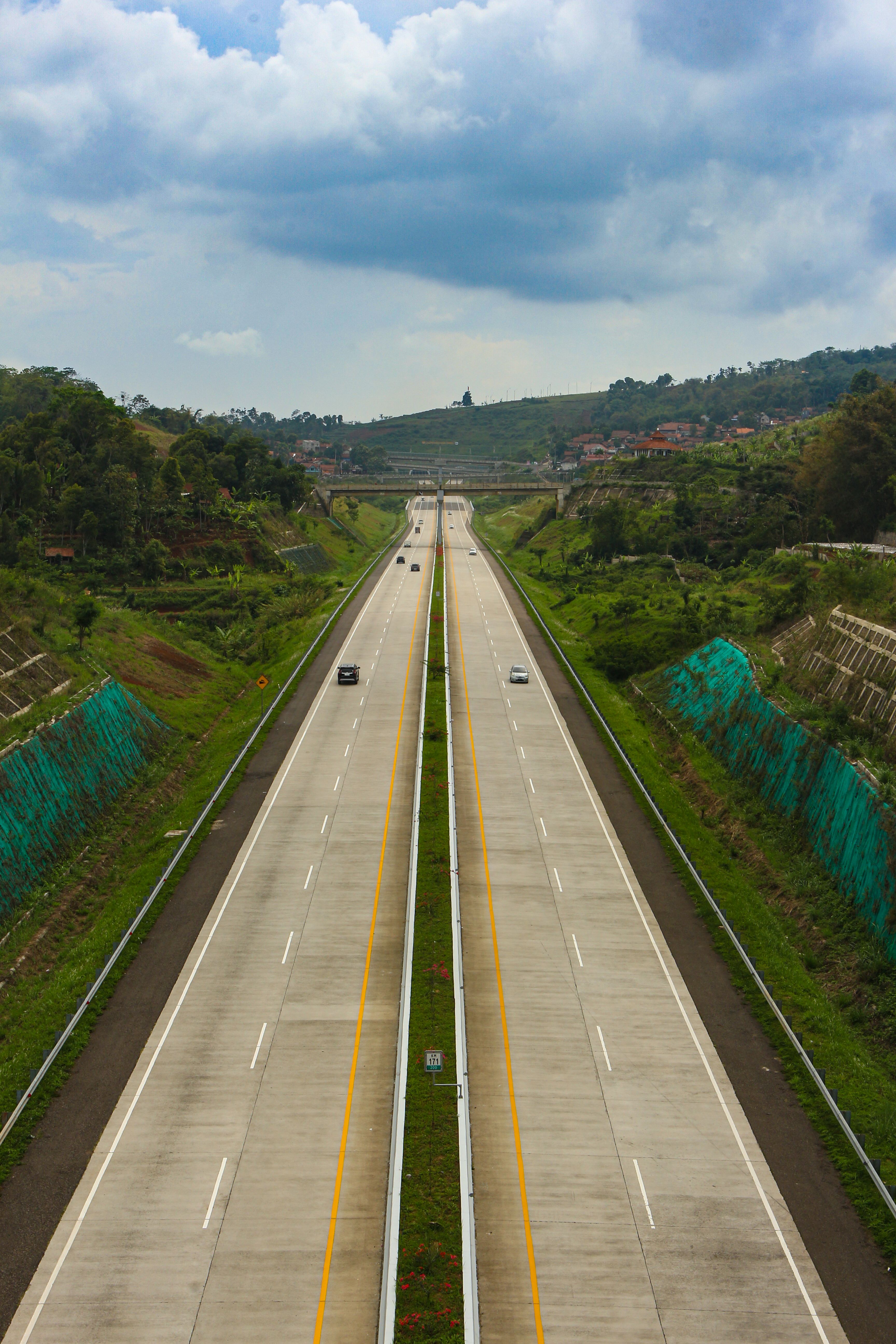Highway Passing through a Scenic Landscape · Free Stock Photo