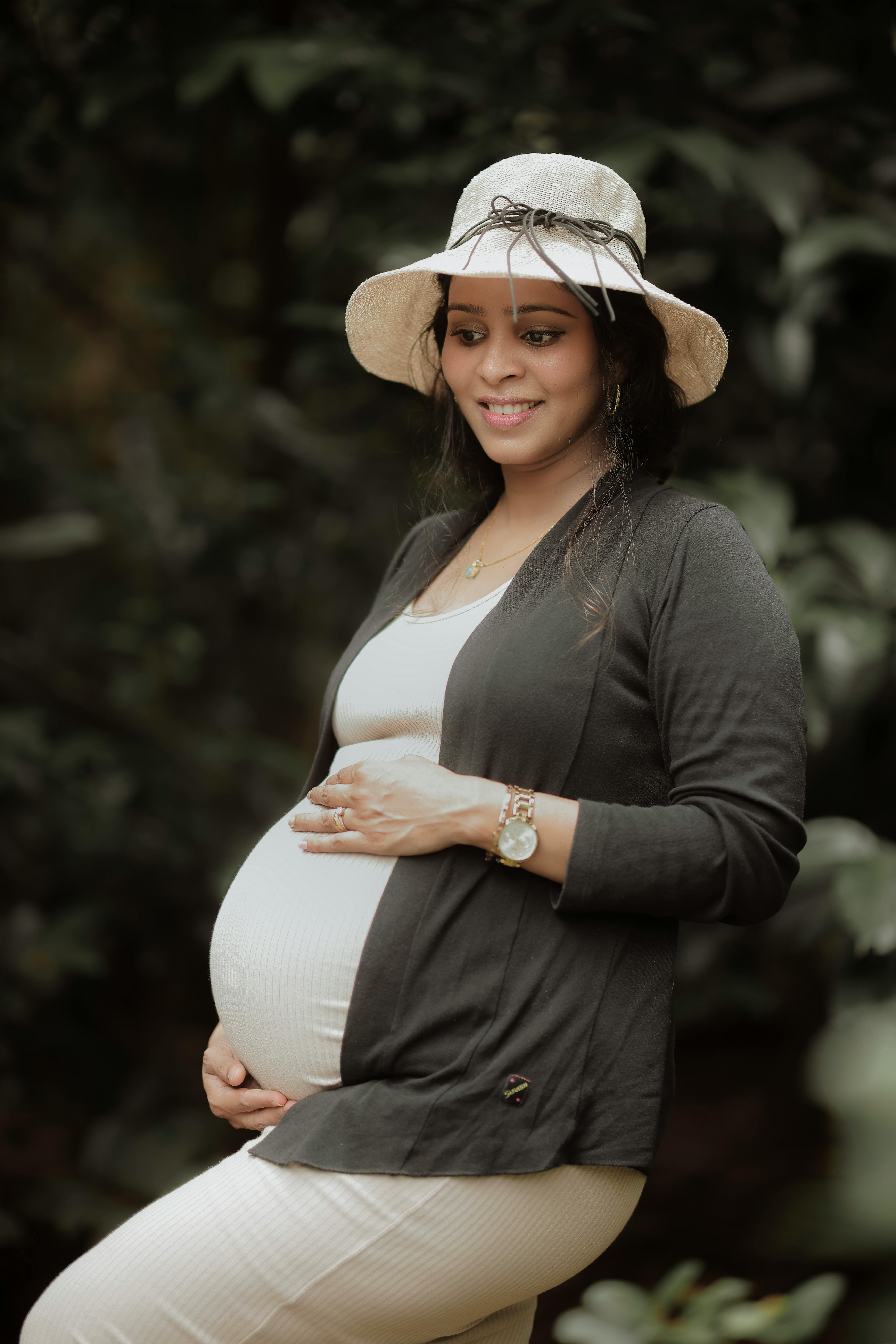 Brunette Woman in Cardigan Posing with Umbrella in Hand · Free Stock Photo