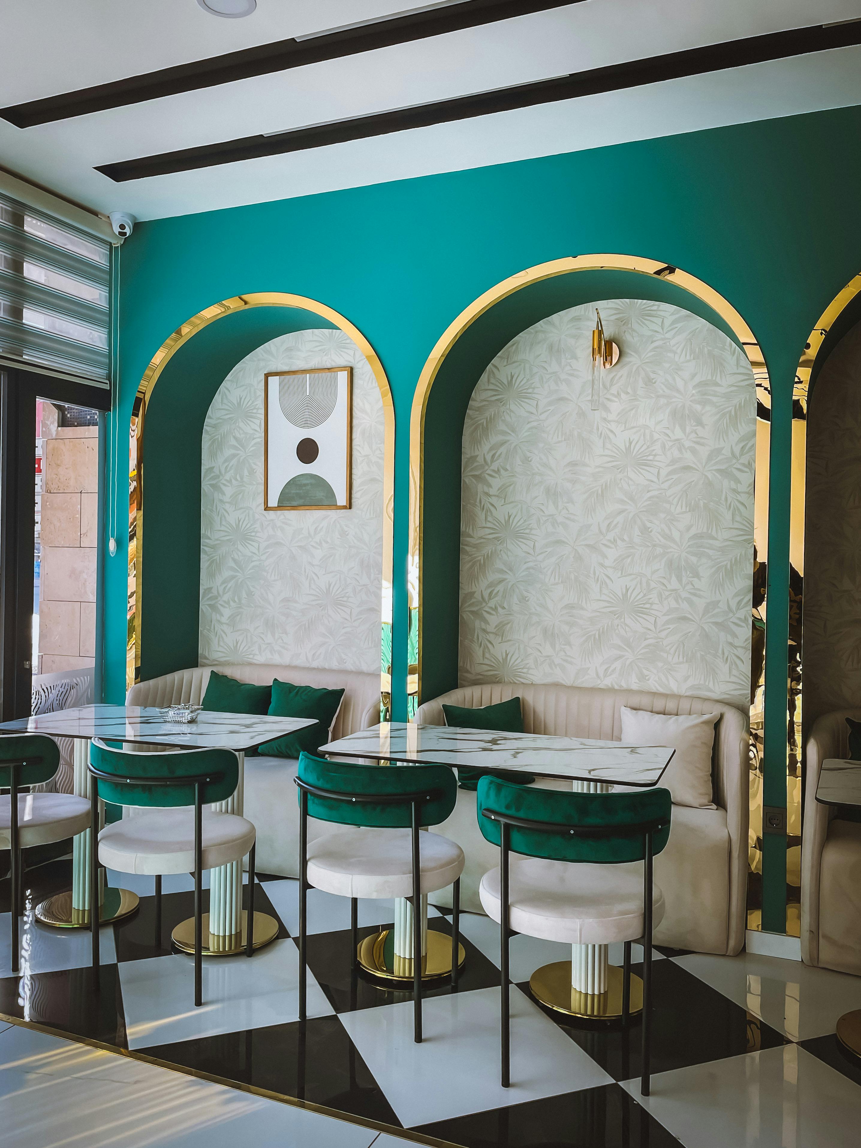 Interior Design of an Elegant Cafe with Sofas in Niches · Free Stock Photo