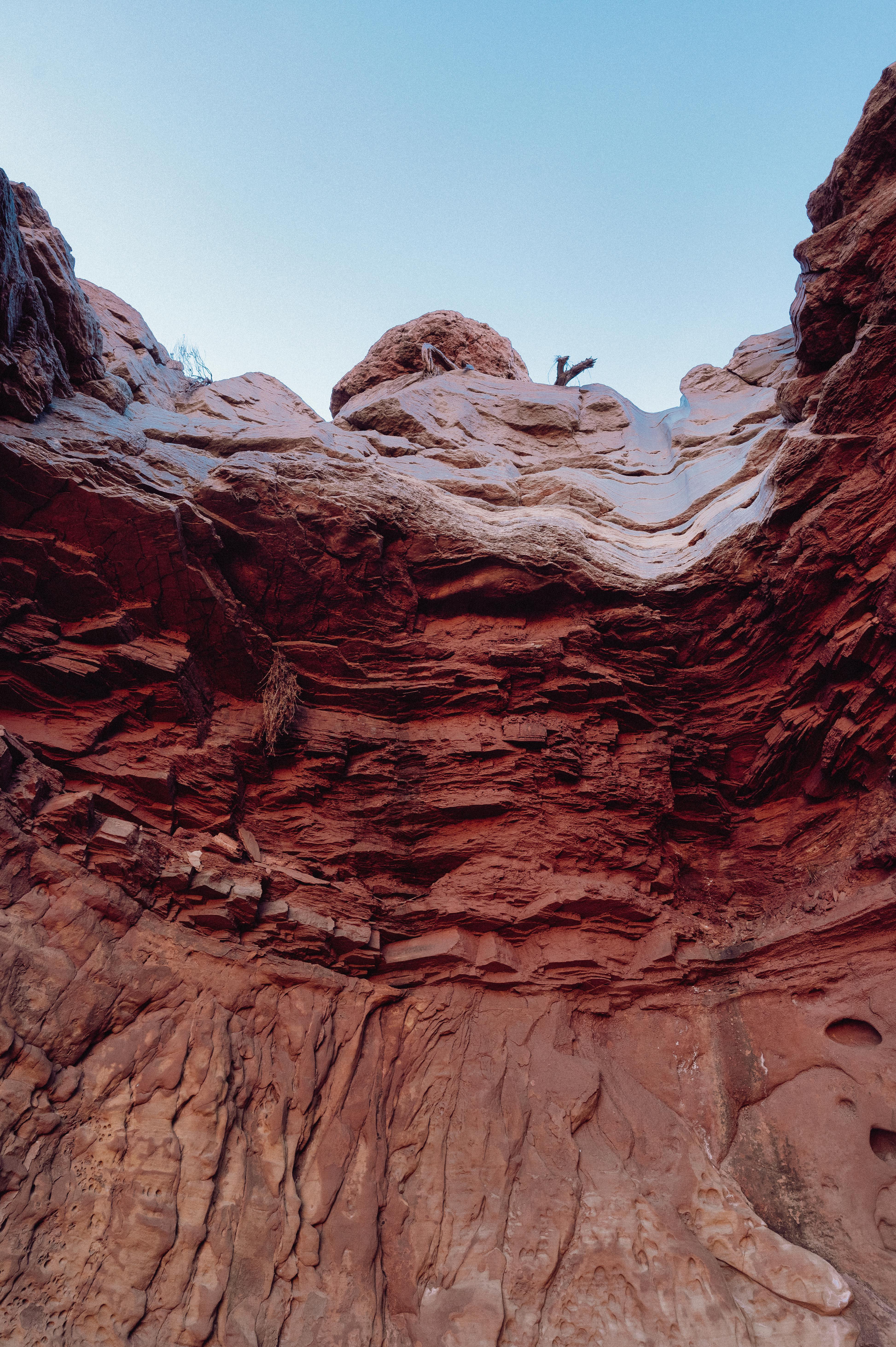 Steep Rock Wall of Red Sandstone · Free Stock Photo