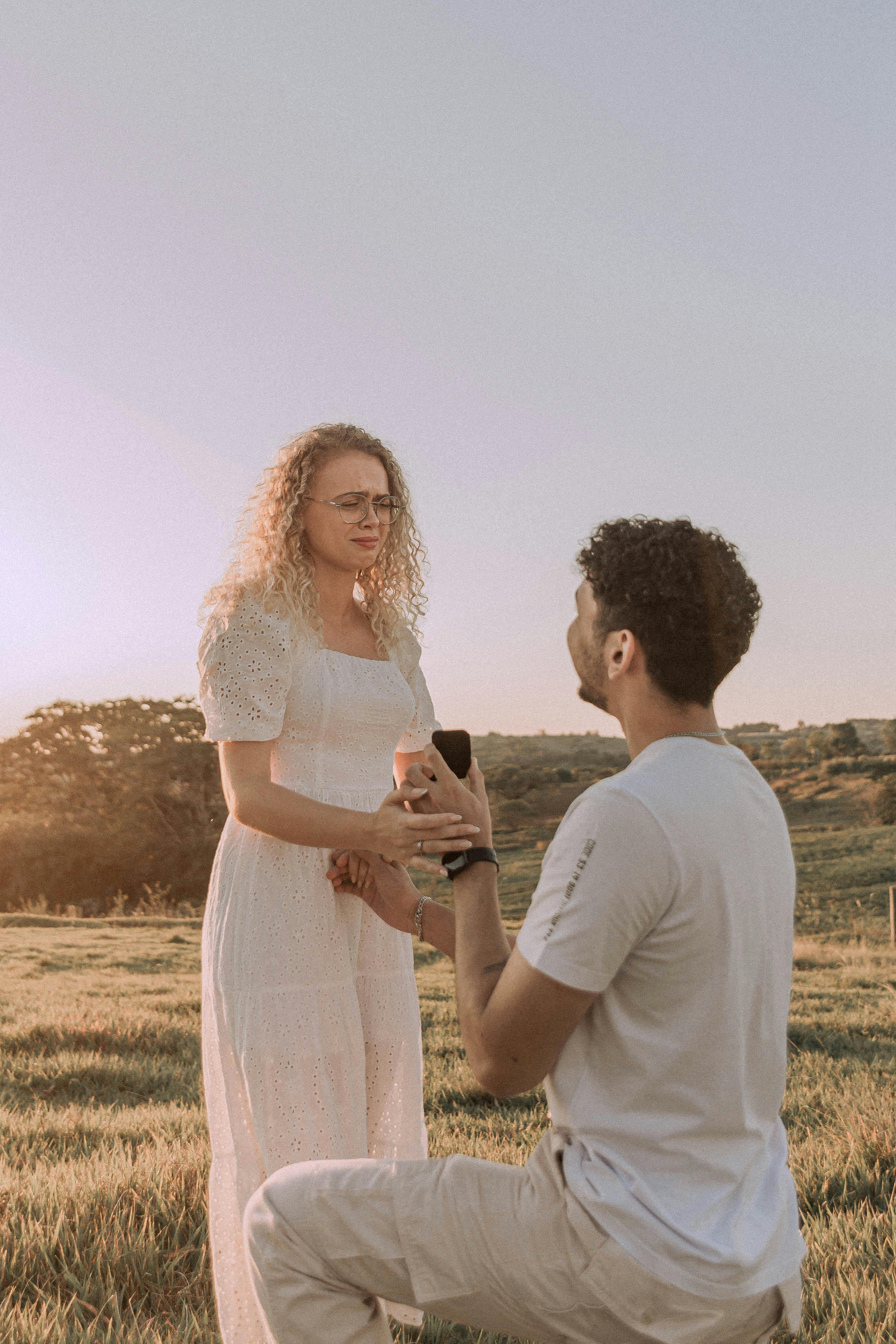 Man Proposing in Summer Rural Scenery · Free Stock Photo