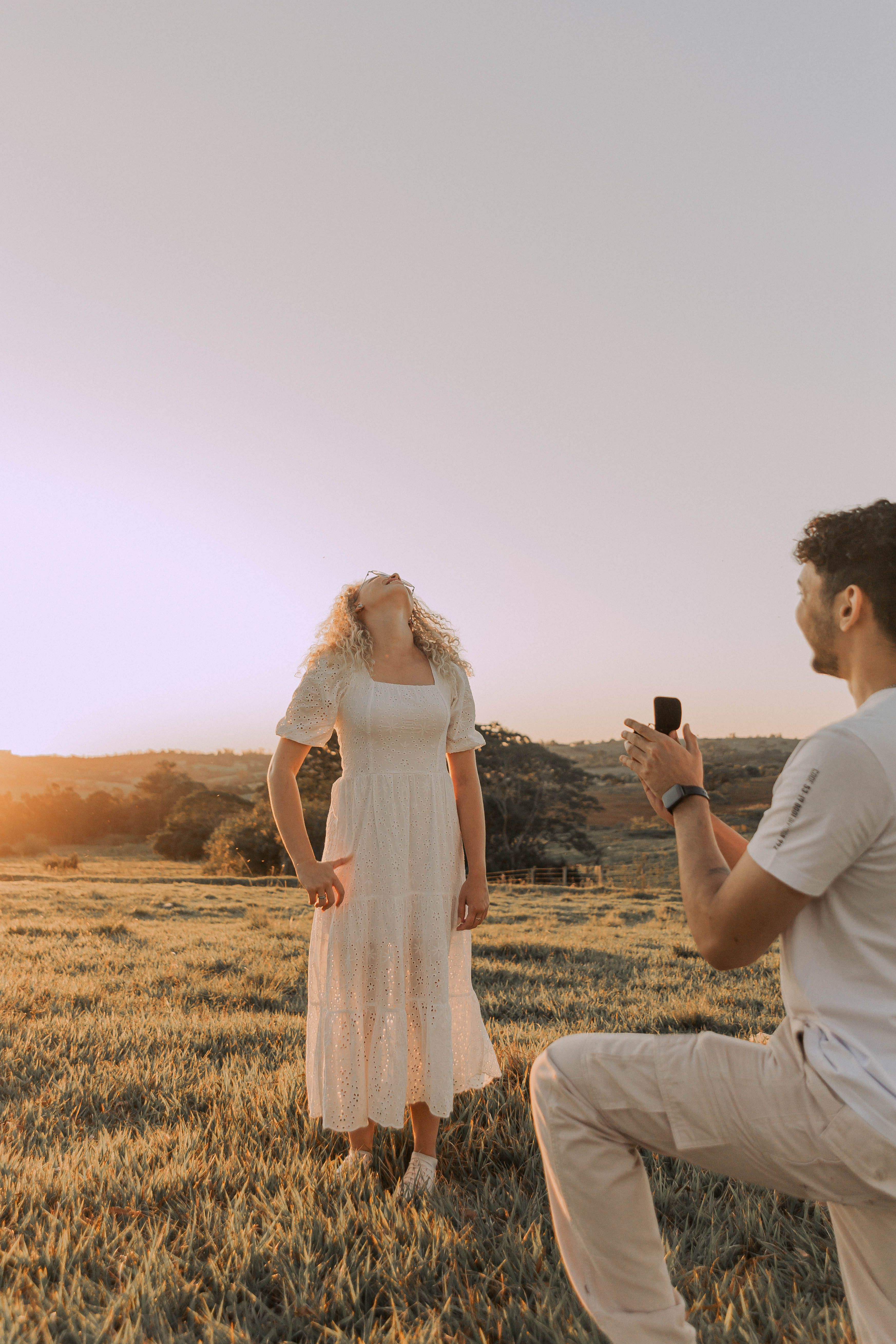 Man Kneeling Before a Woman Making a Marriage Proposal · Free Stock Photo