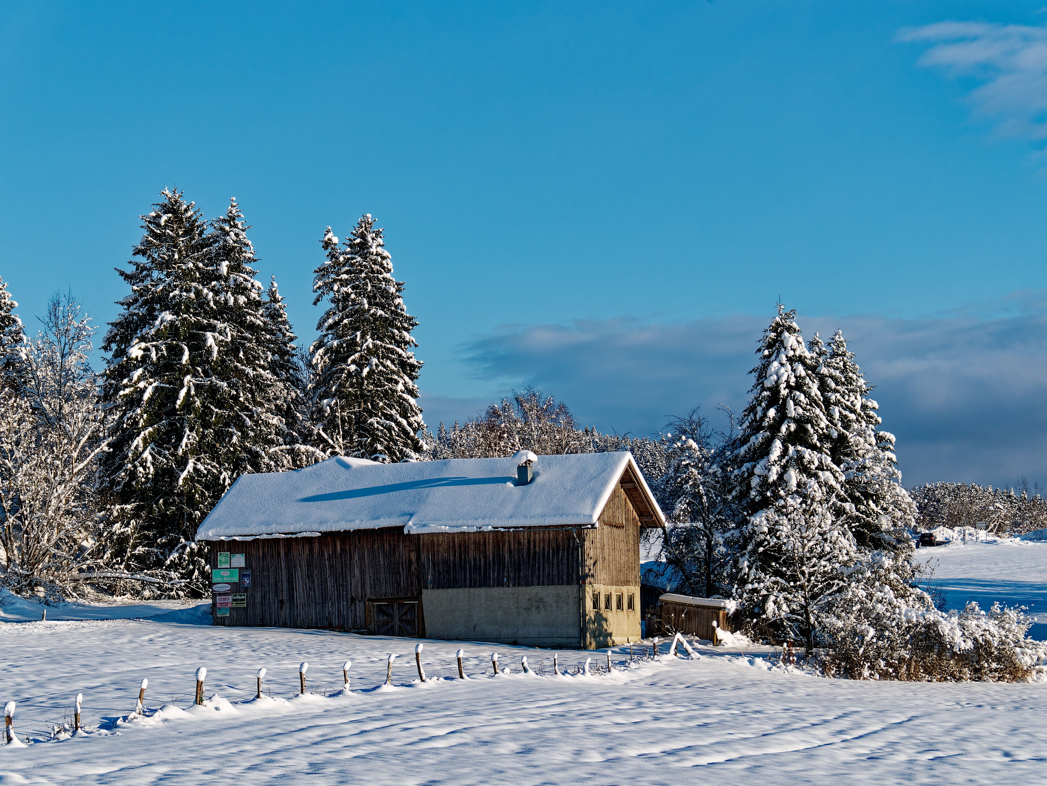 Rustic Wooden Cabin in Snowy Alpine Landscape · Free Stock Photo
