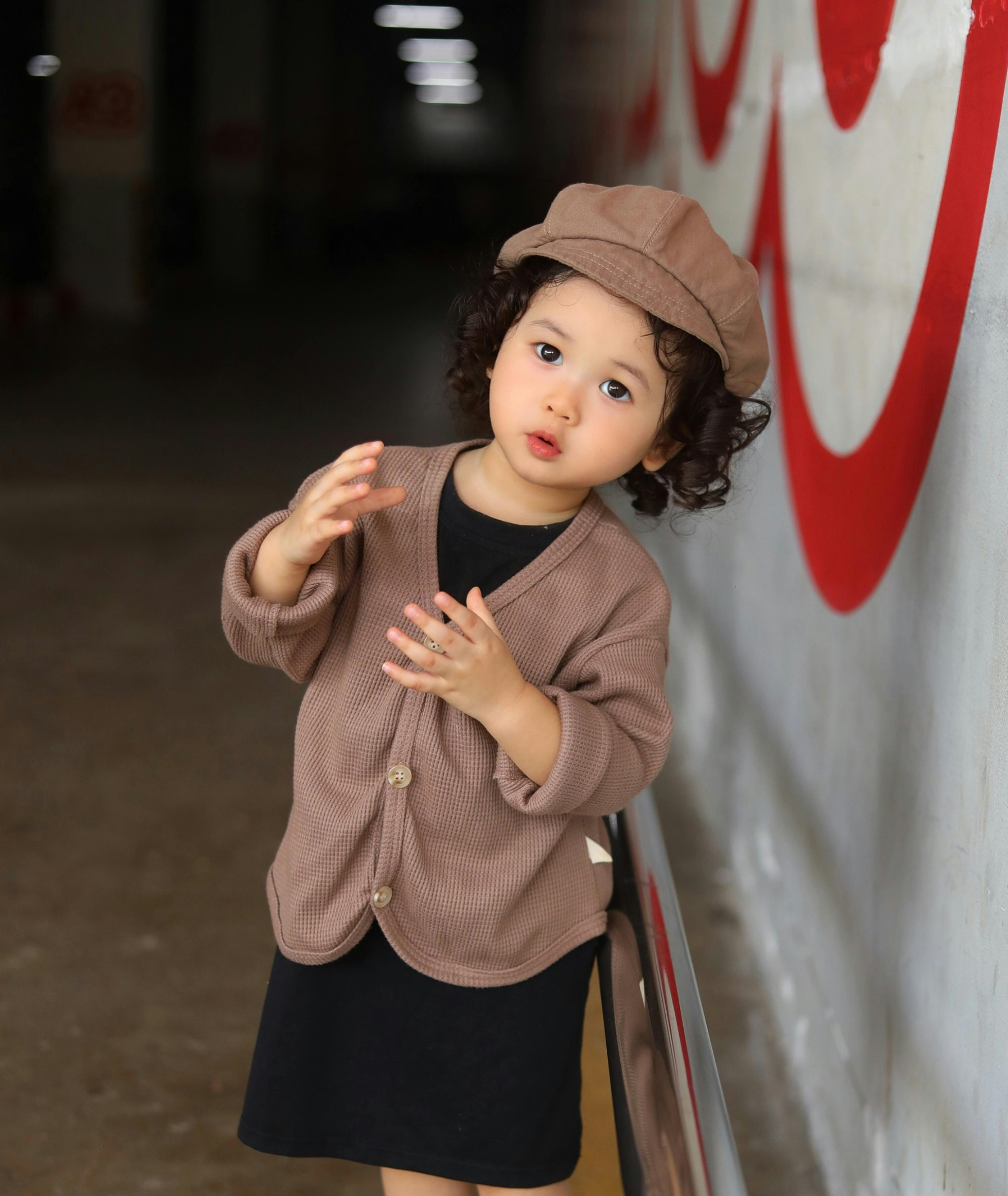 Child Model Posing in Hat and · Free Stock Photo