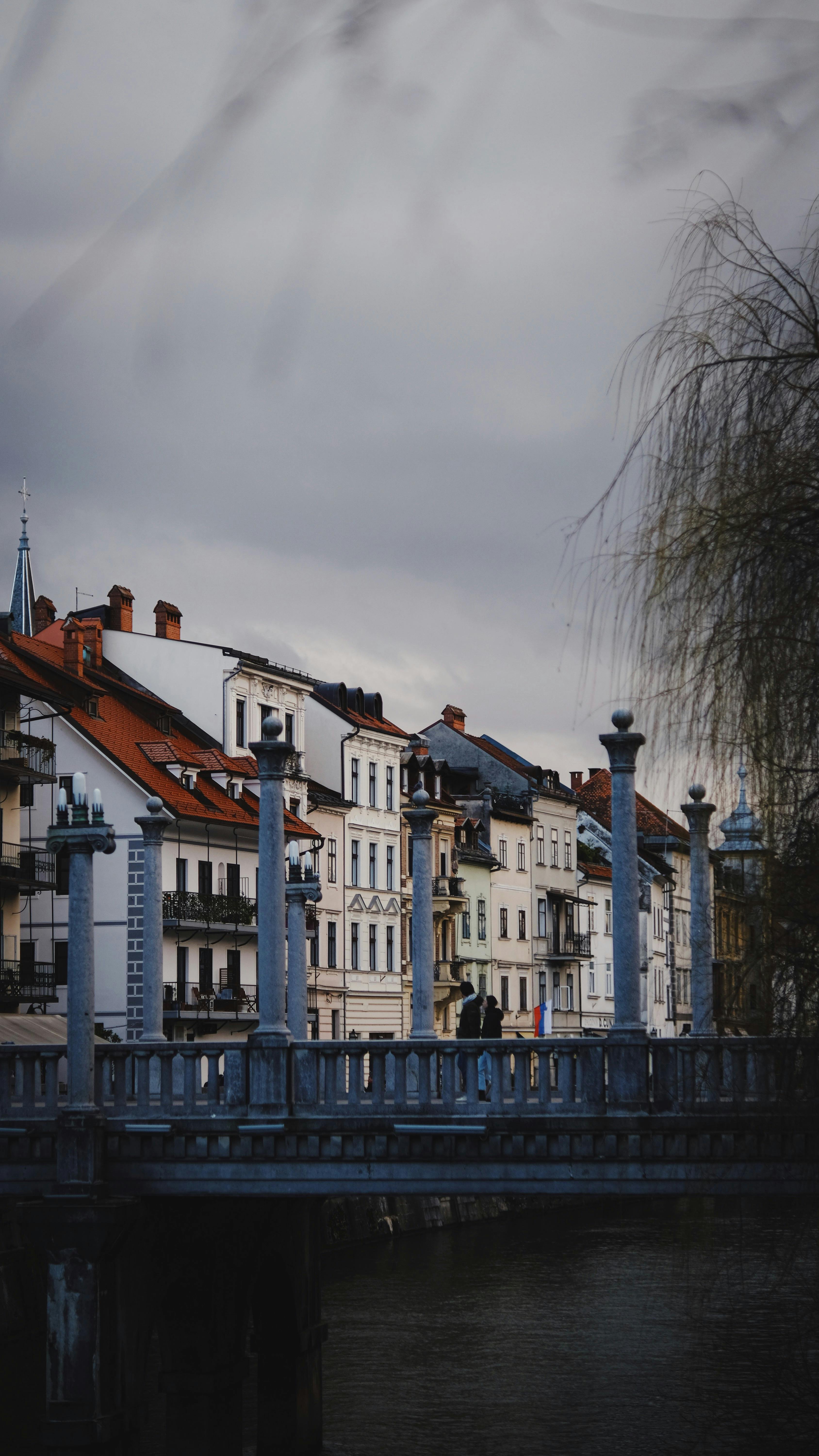 Buildings behind Bridge in City in Slovenia · Free Stock Photo