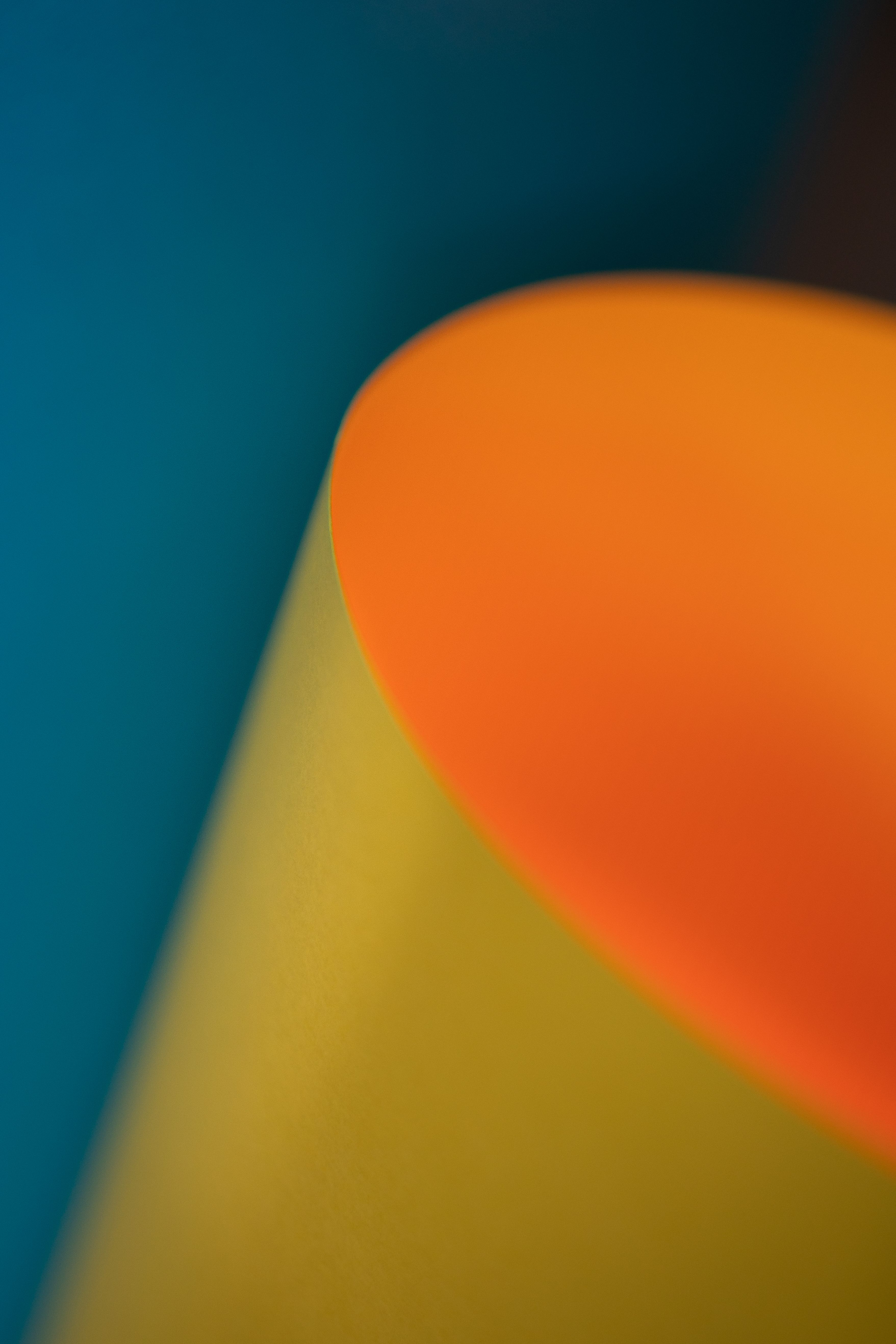 Close-up of a Yellow Object on Blue Background · Free Stock Photo