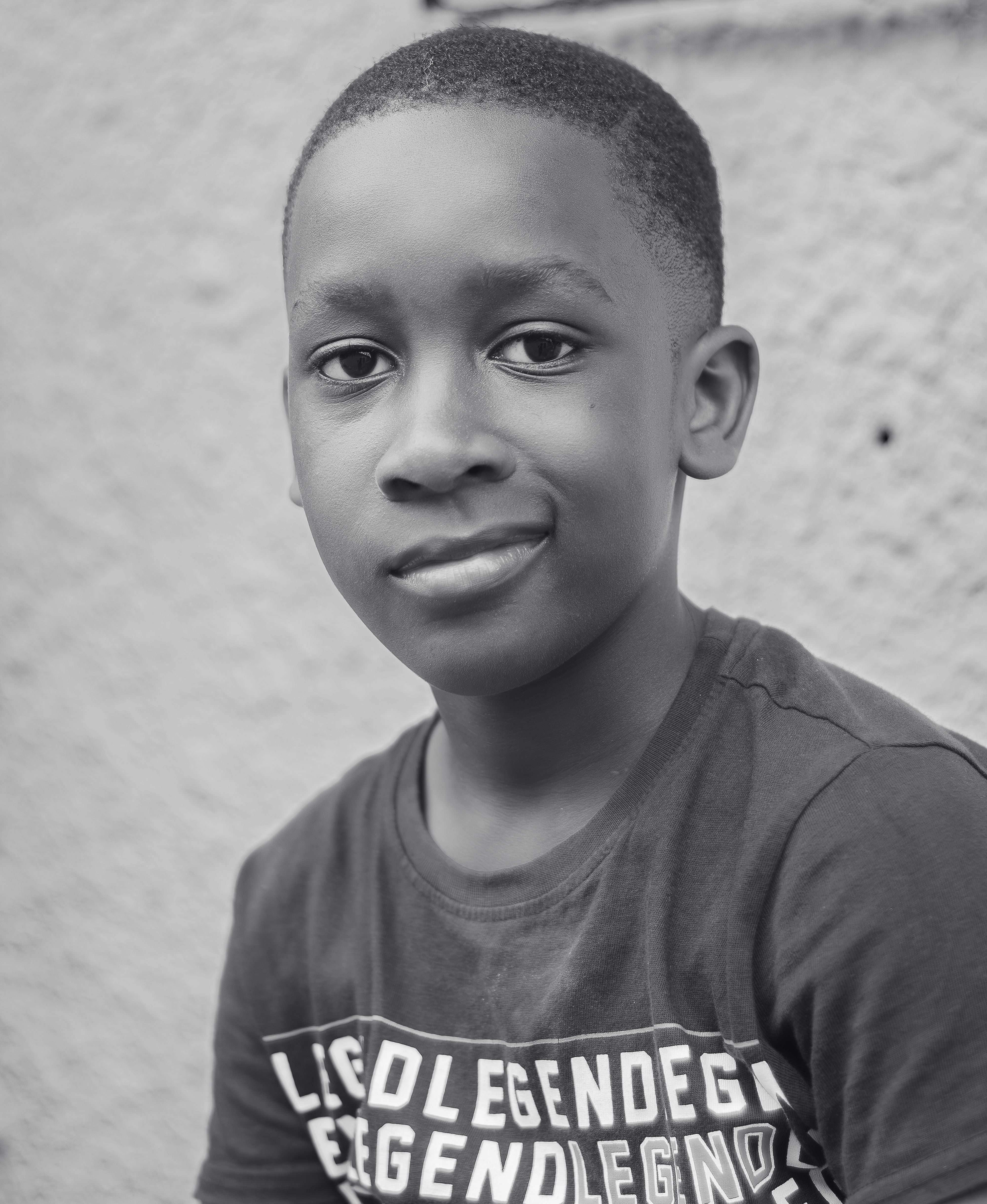 Portrait of a Boy Wearing a Taqiyah Cap · Free Stock Photo