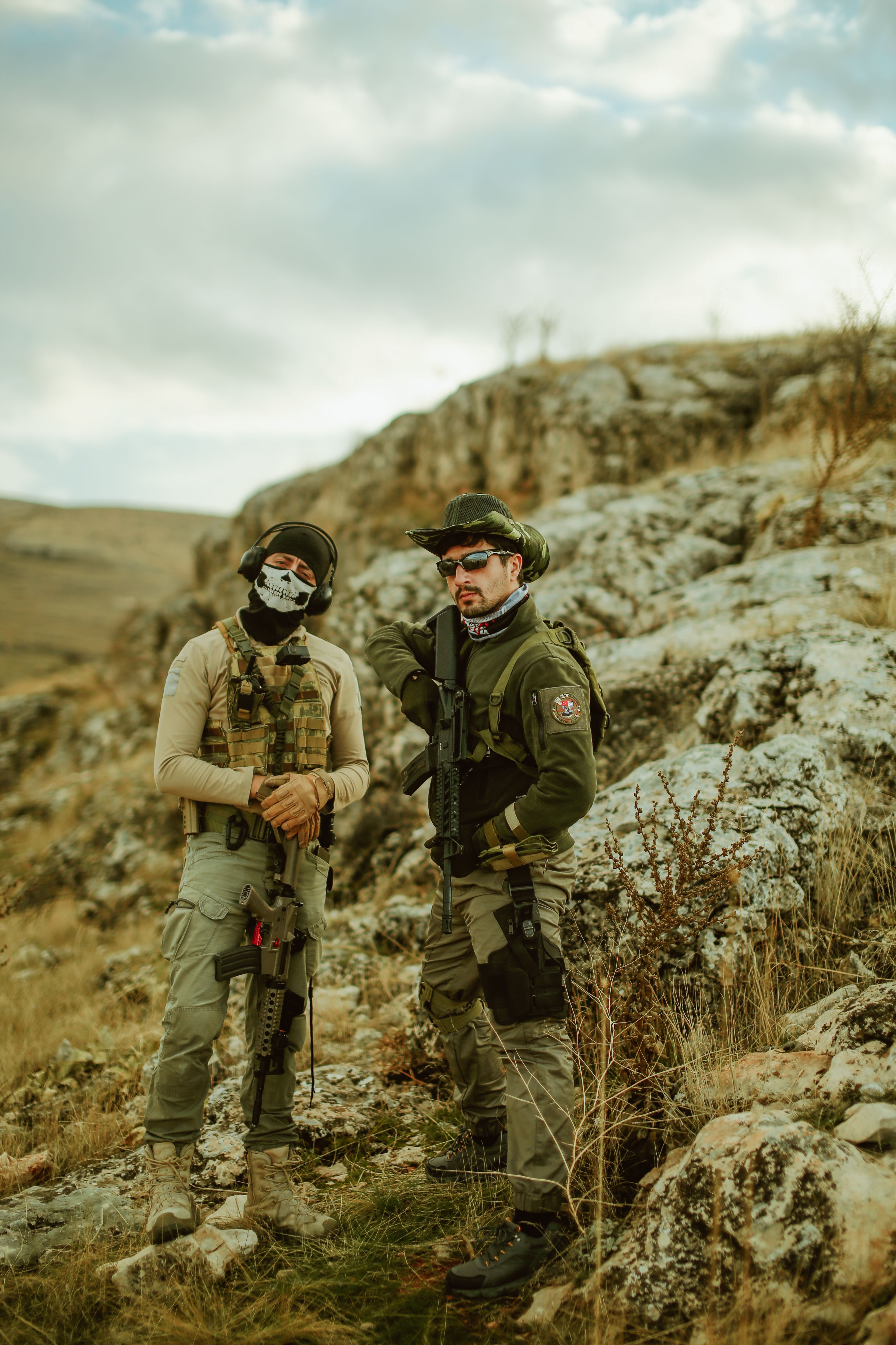 A Military Personnel Holding a Rifle · Free Stock Photo