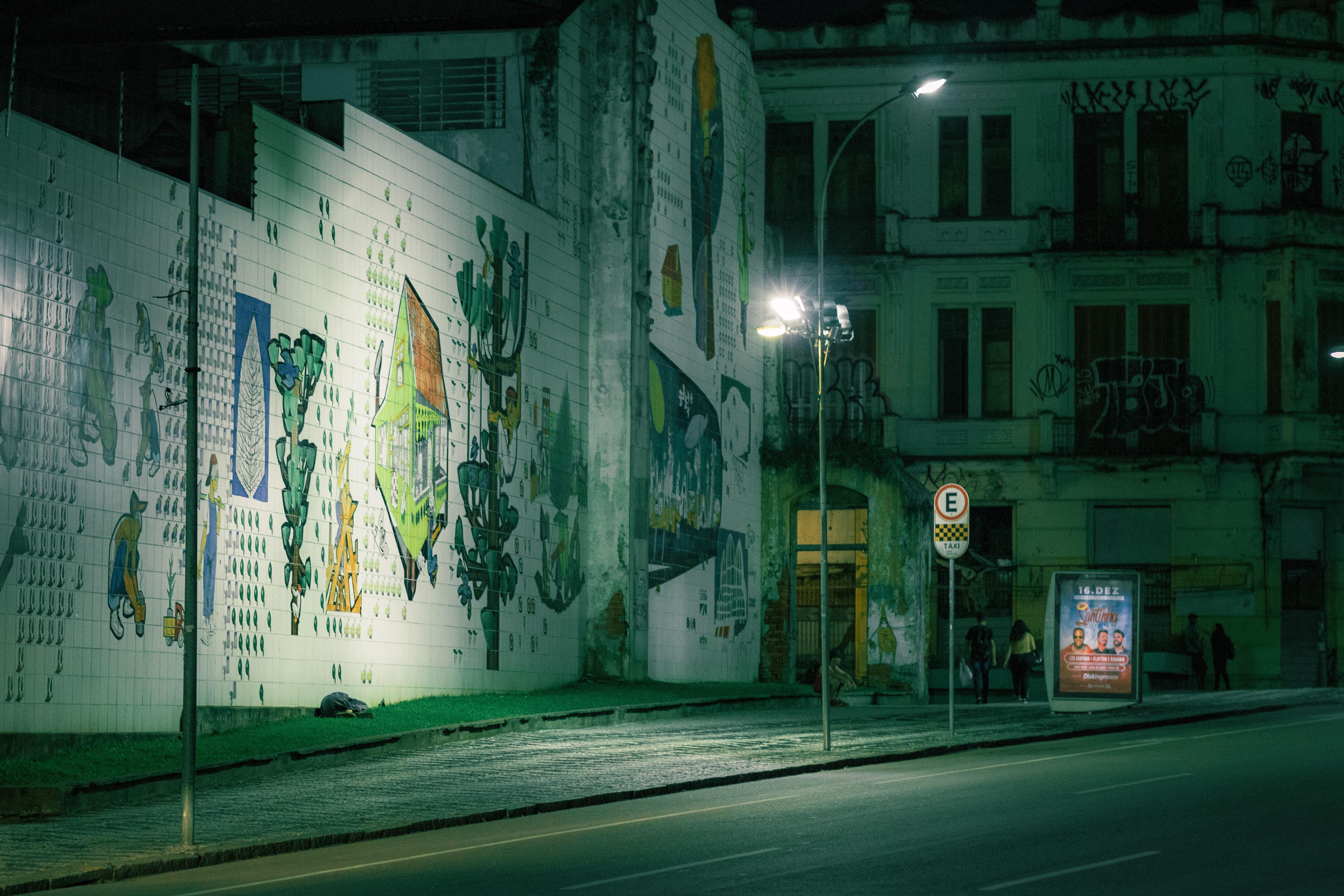 A Street and Walls with Graffiti in City at Night · Free Stock Photo