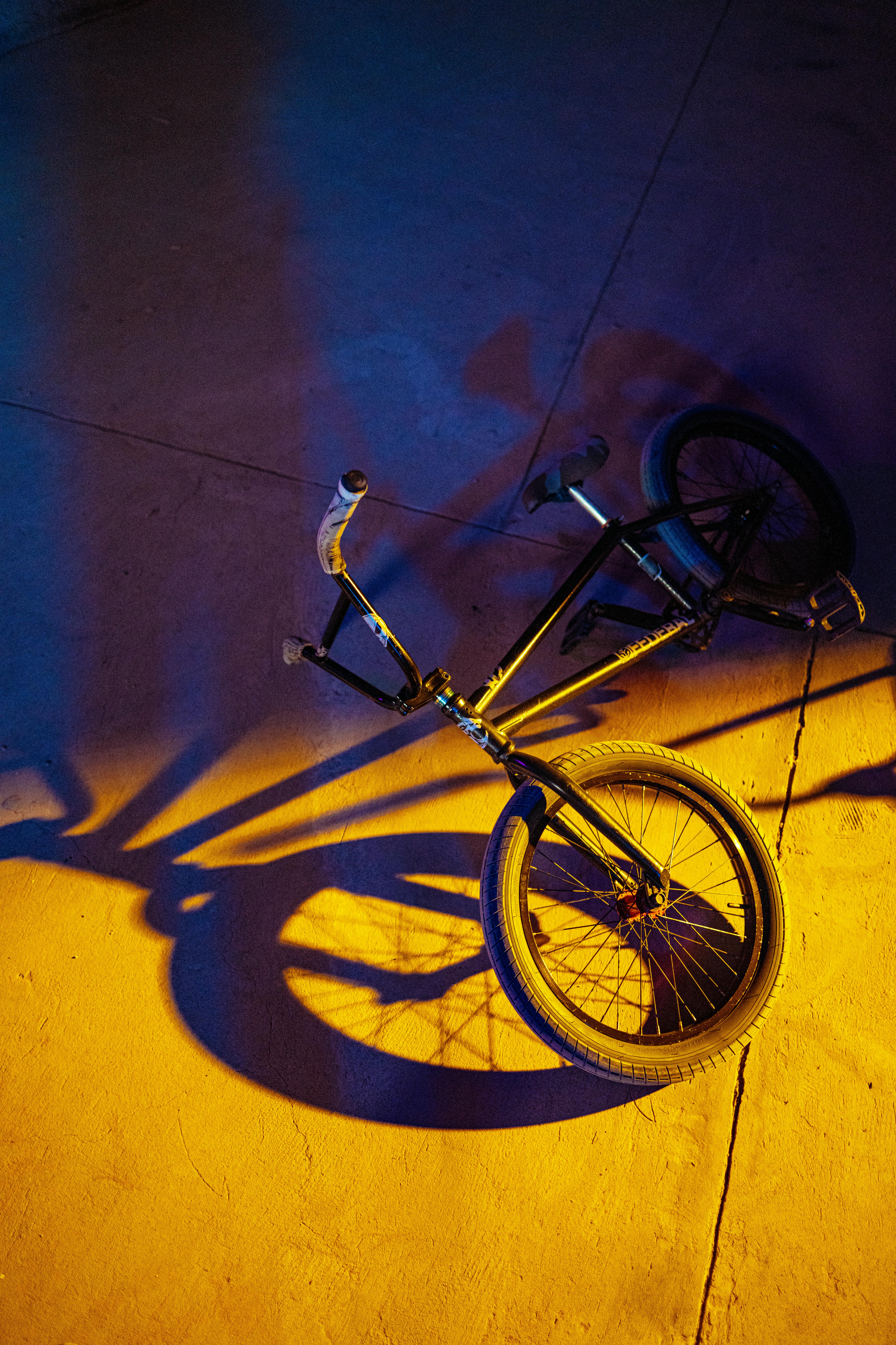 A BMX Bicycle Lying on the Ground · Free Stock Photo