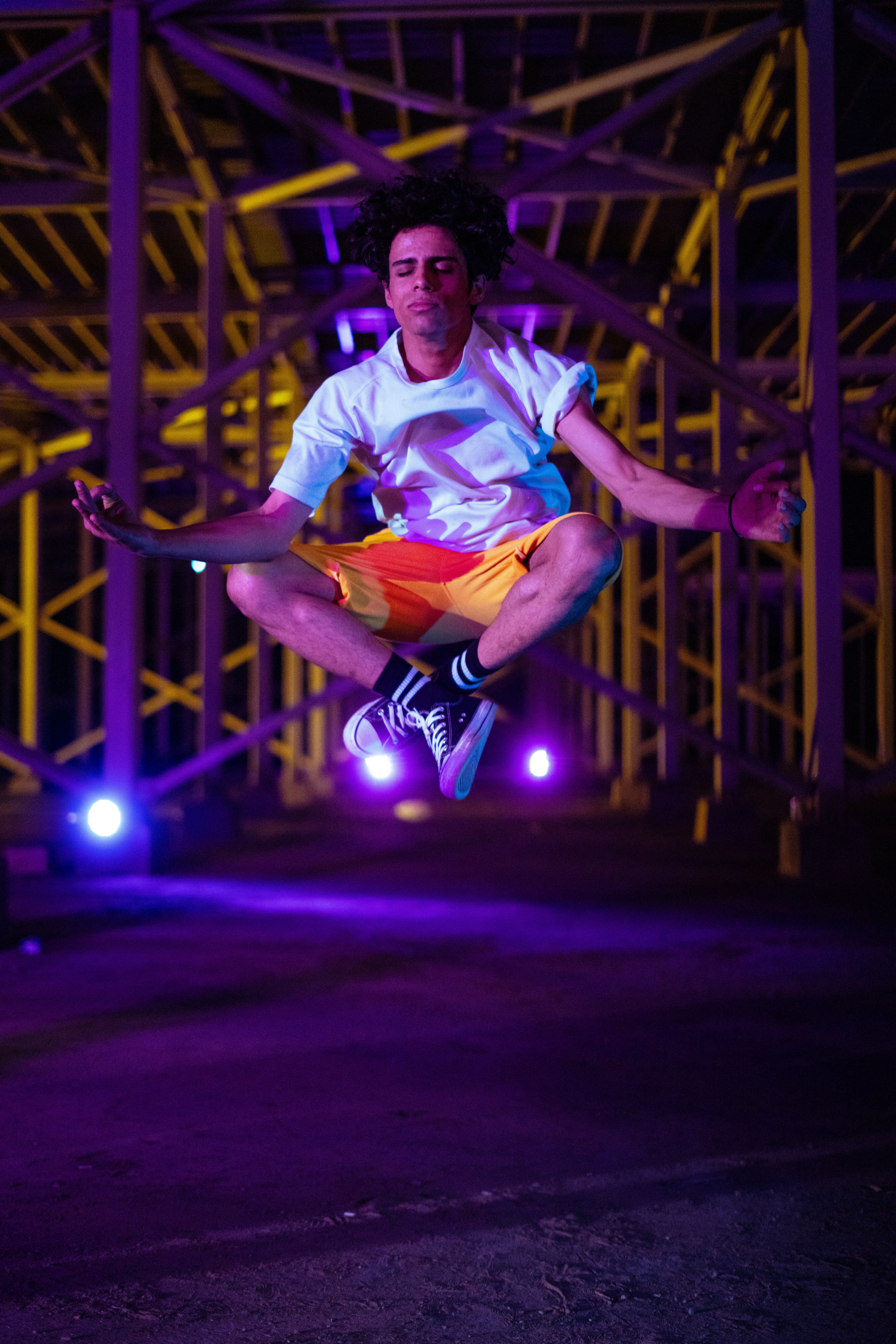 Man Hovering over Pavement at Night · Free Stock Photo