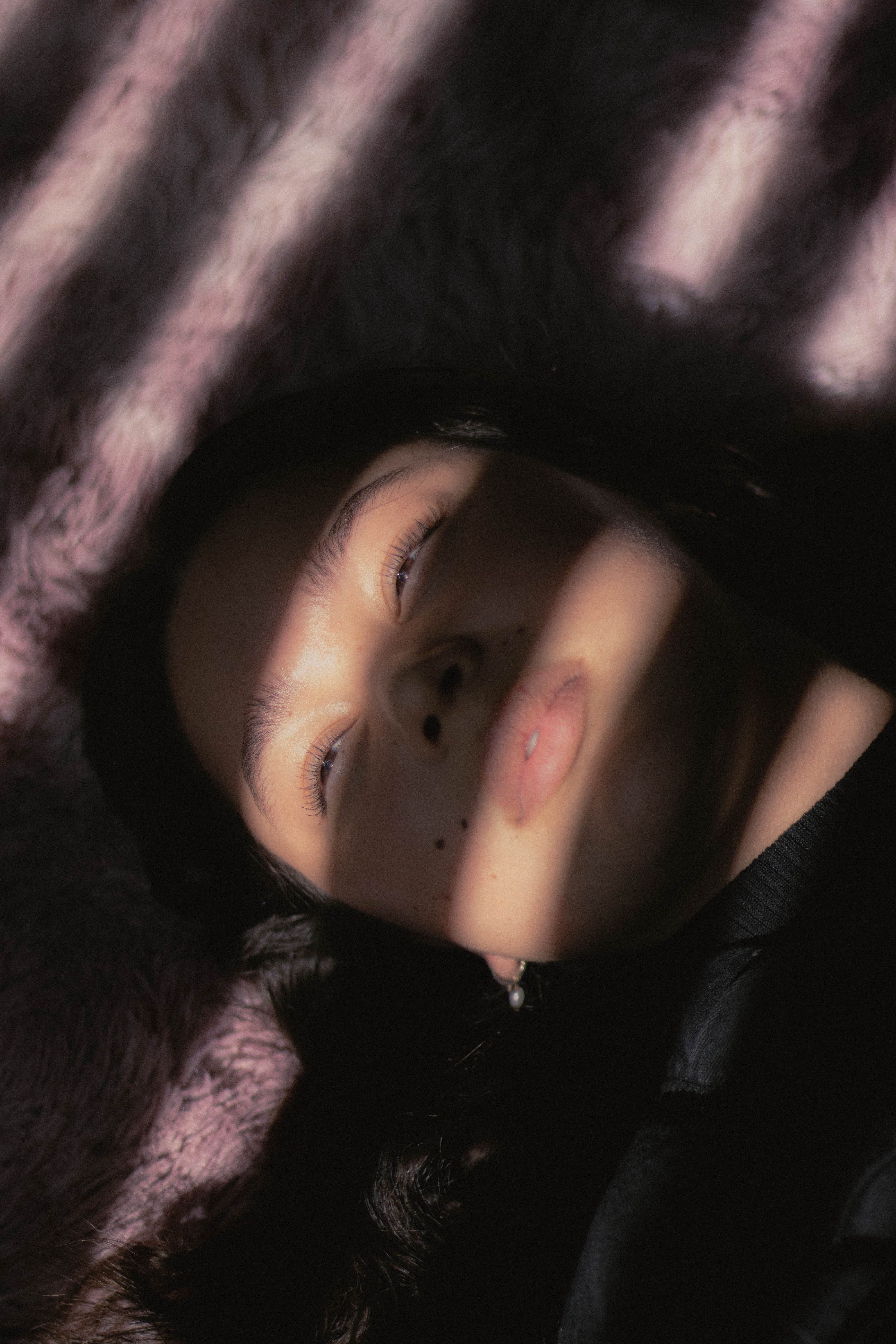 Shadows over Woman Lying Down · Free Stock Photo