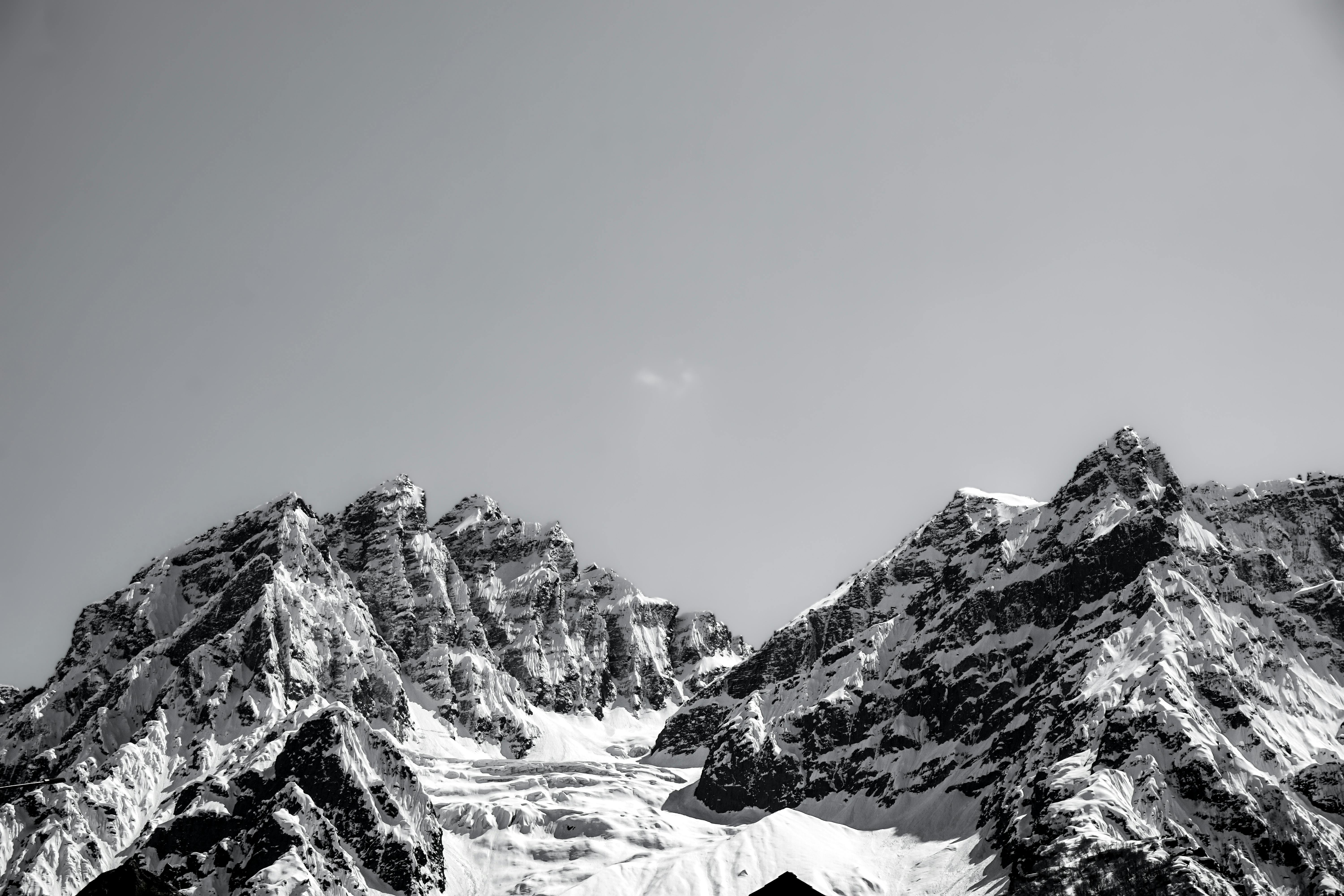 Snowed on Alpine Rough Mountains · Free Stock Photo