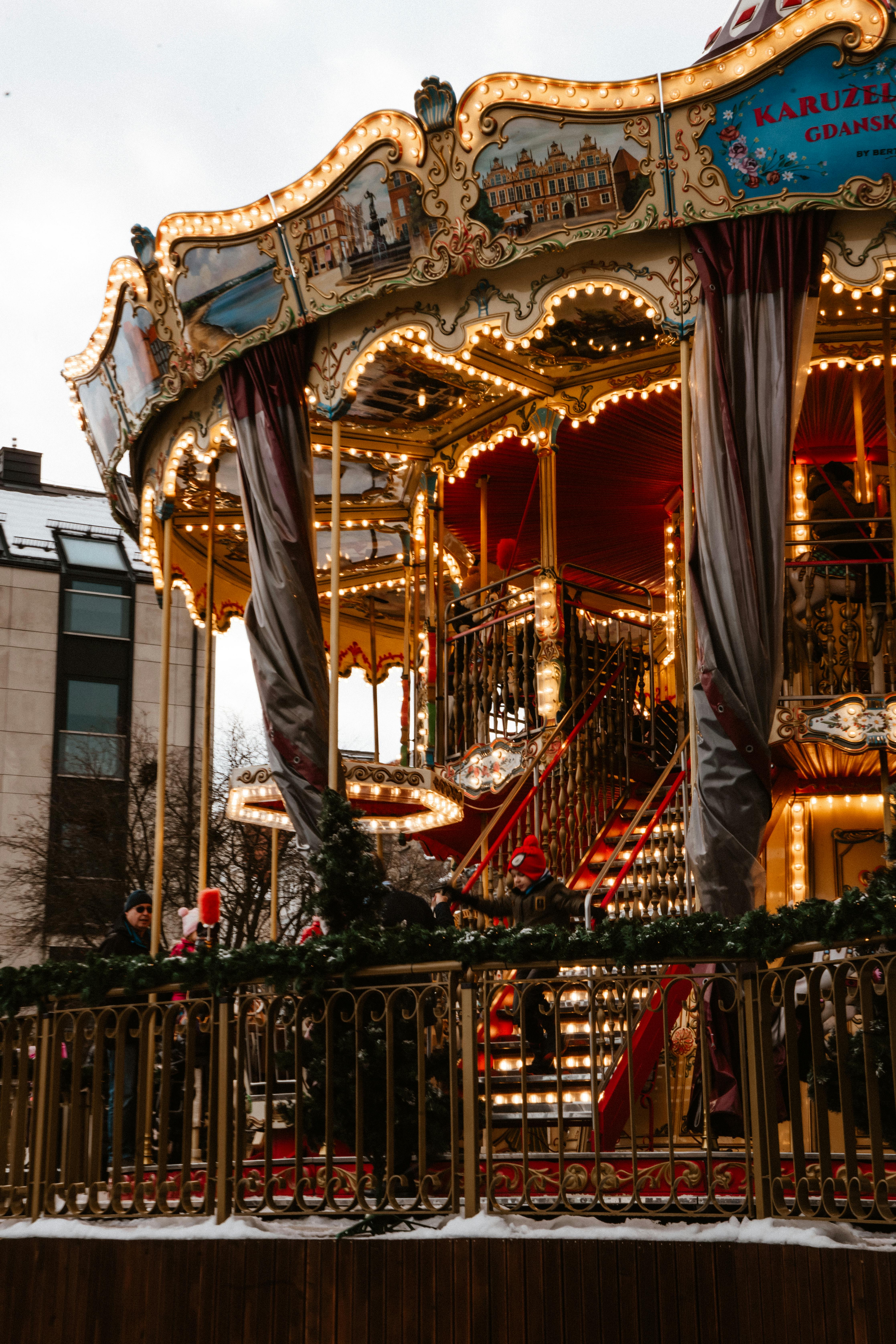 Colorful luminous carousel against Kremlin on Red Square at night ...