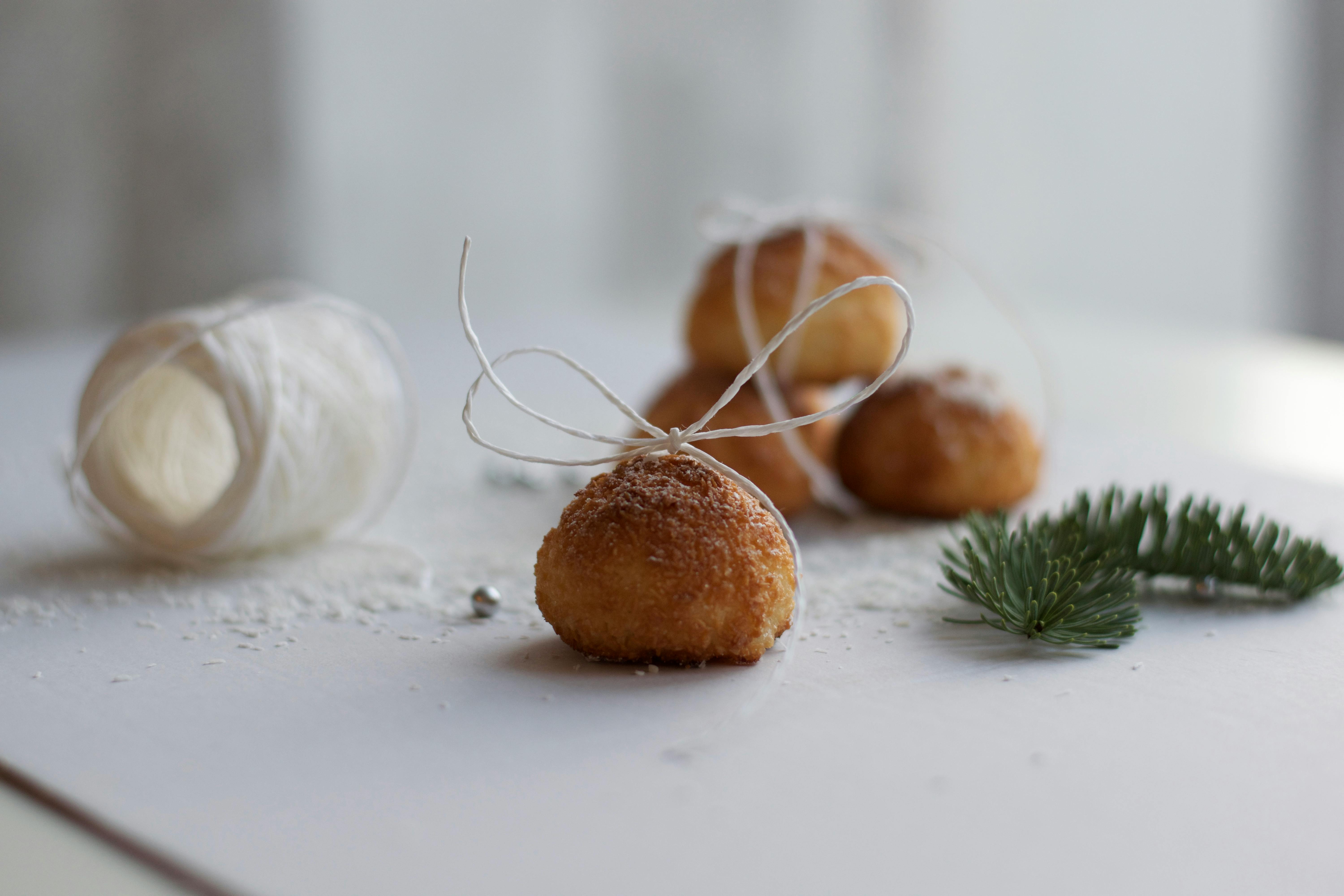 Close-up of Pastries Decorated with a Bow for Christmas · Free Stock Photo