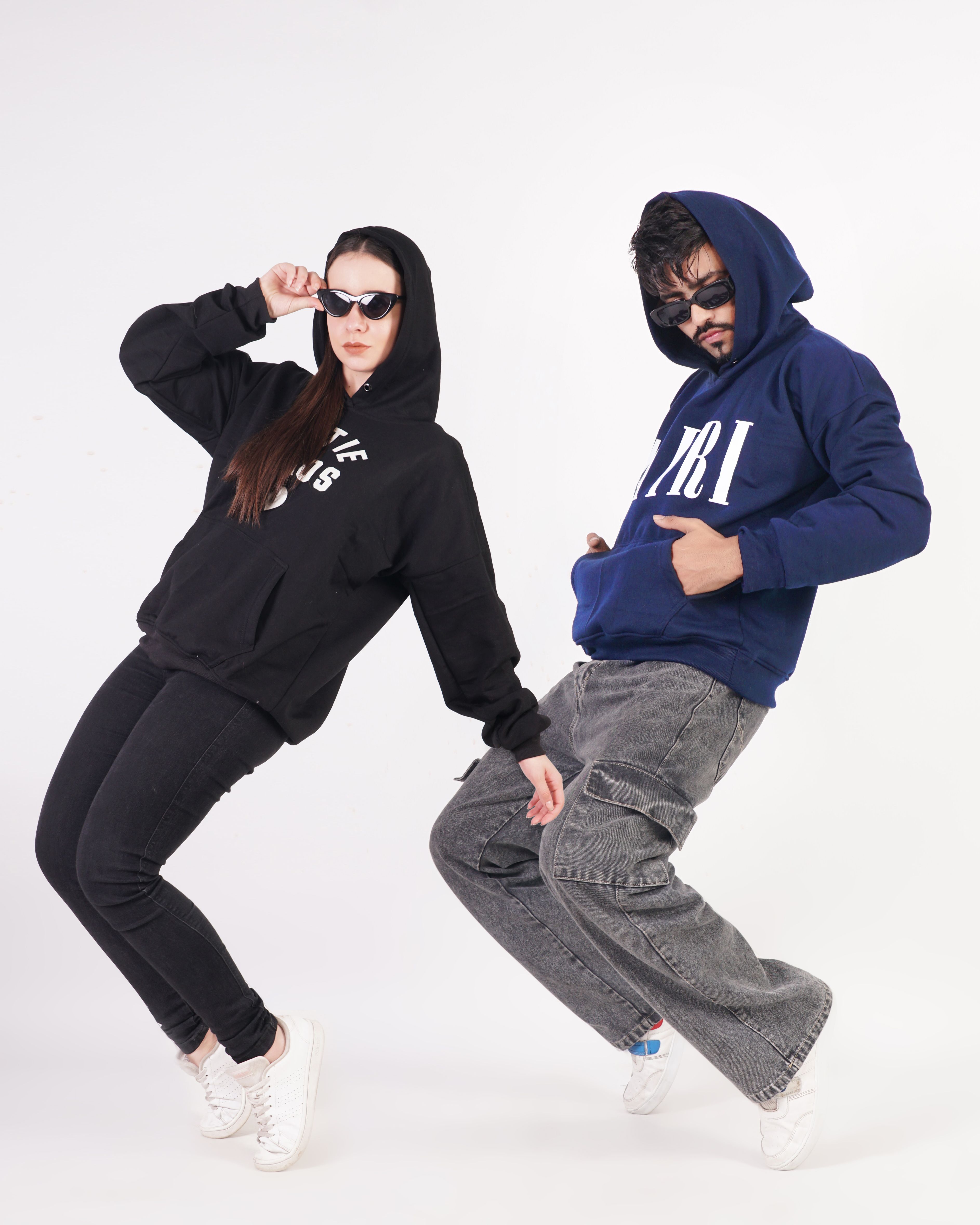 Models Posing in Hoodies · Free Stock Photo