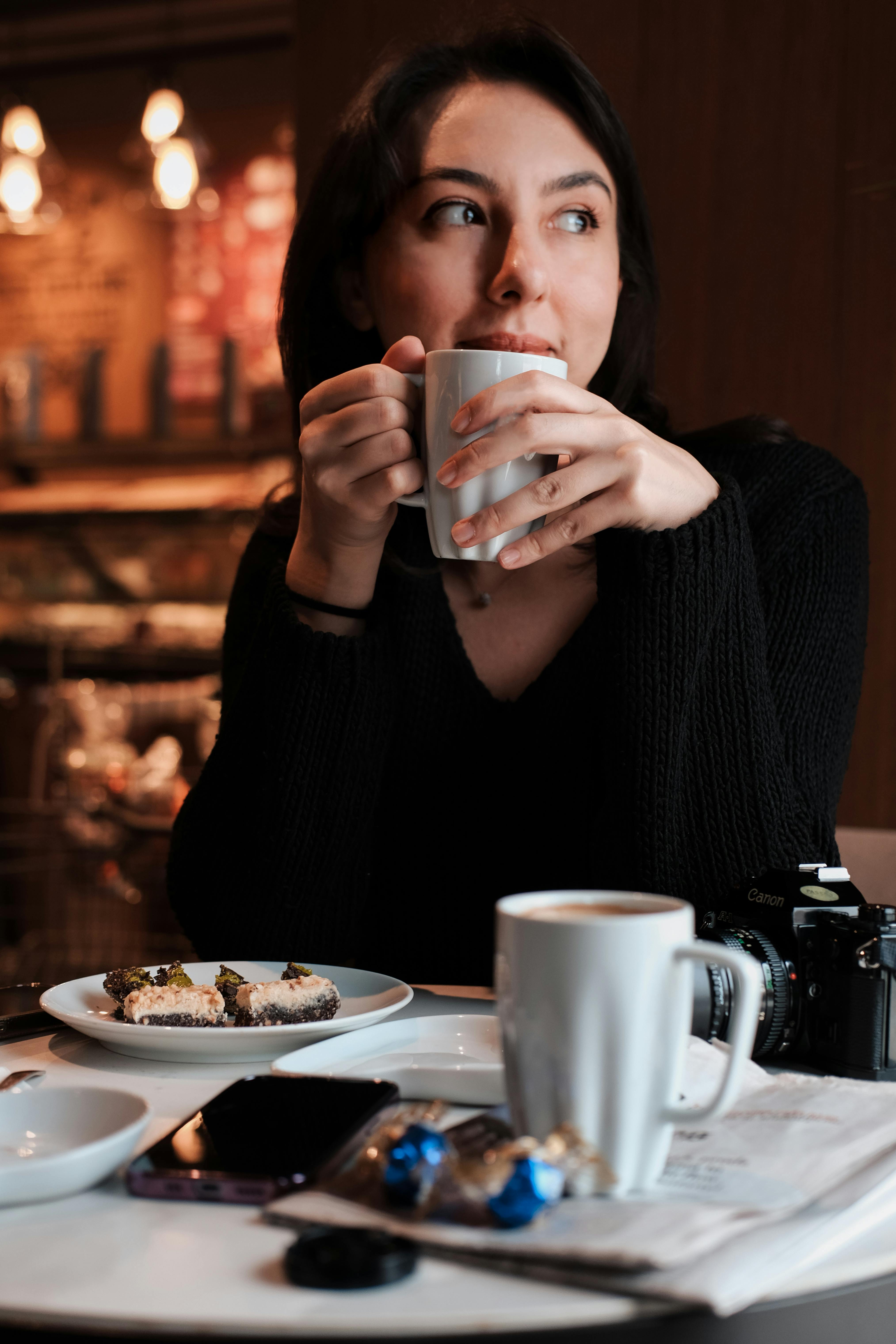 Woman Relaxing with Coffee · Free Stock Photo